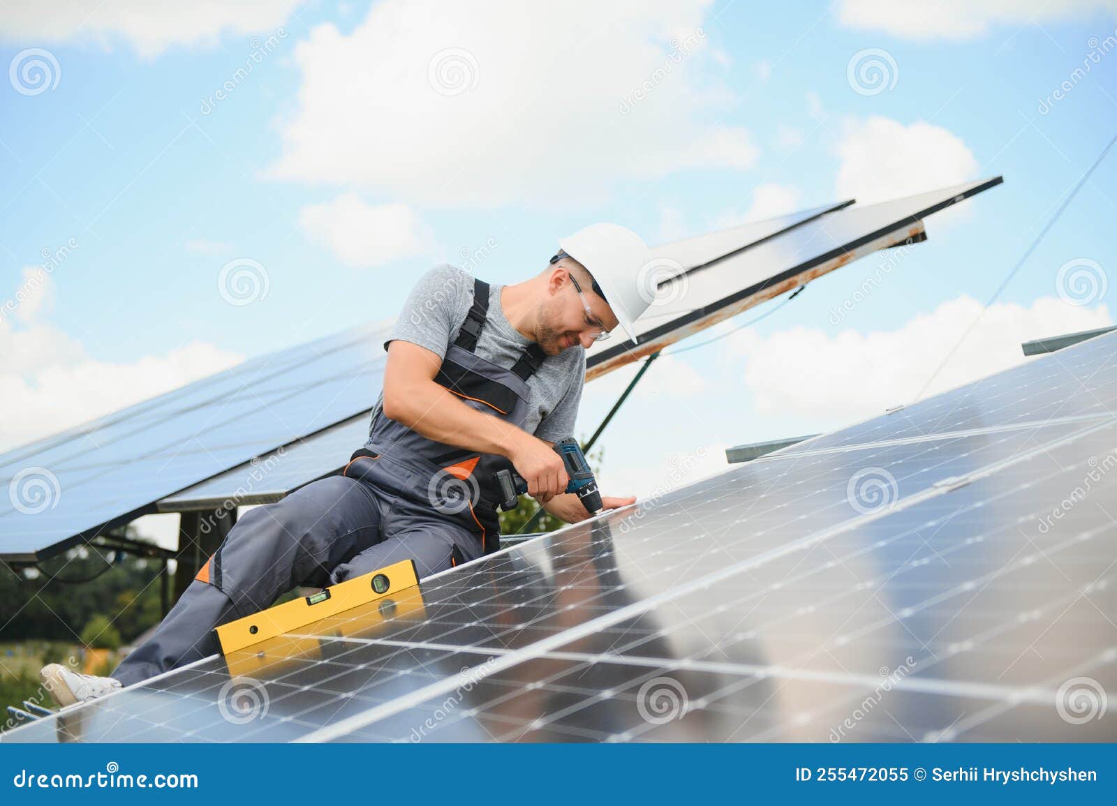 A Man Working at Solar Power Station. Stock Image - Image of cell ...