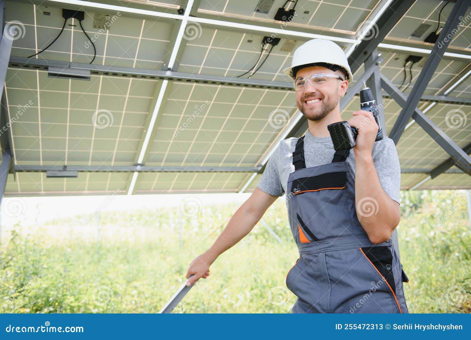 A Man Working at Solar Power Station. Stock Image - Image of house ...