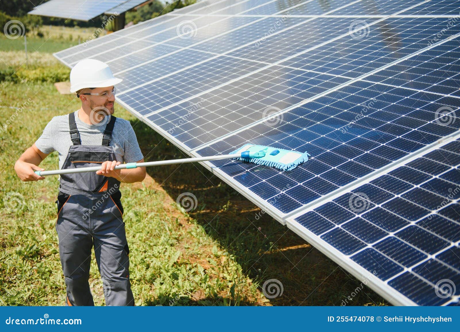 A Man Working at Solar Power Station. Stock Photo - Image of safety ...