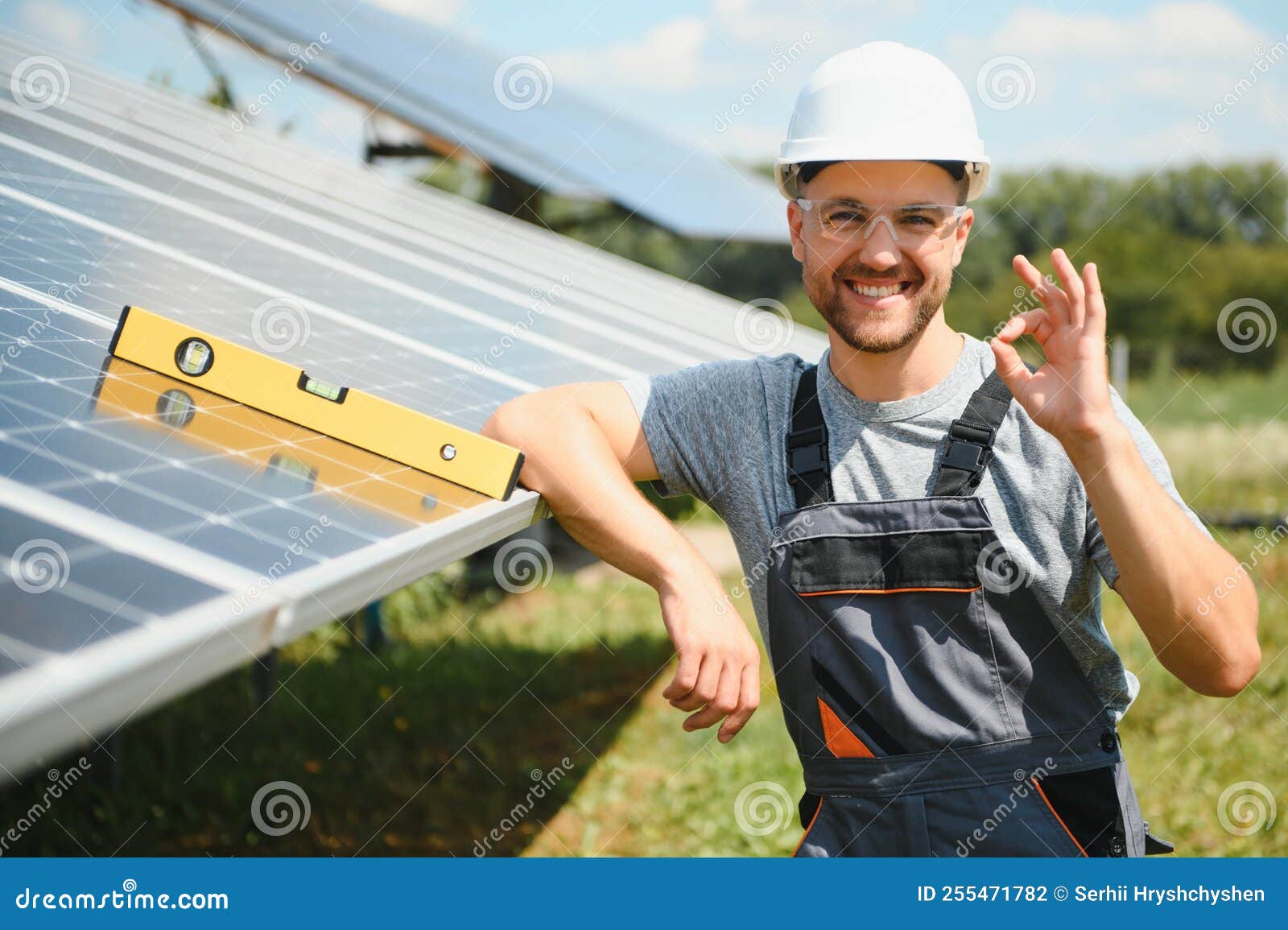 A Man Working at Solar Power Station. Stock Photo - Image of green ...