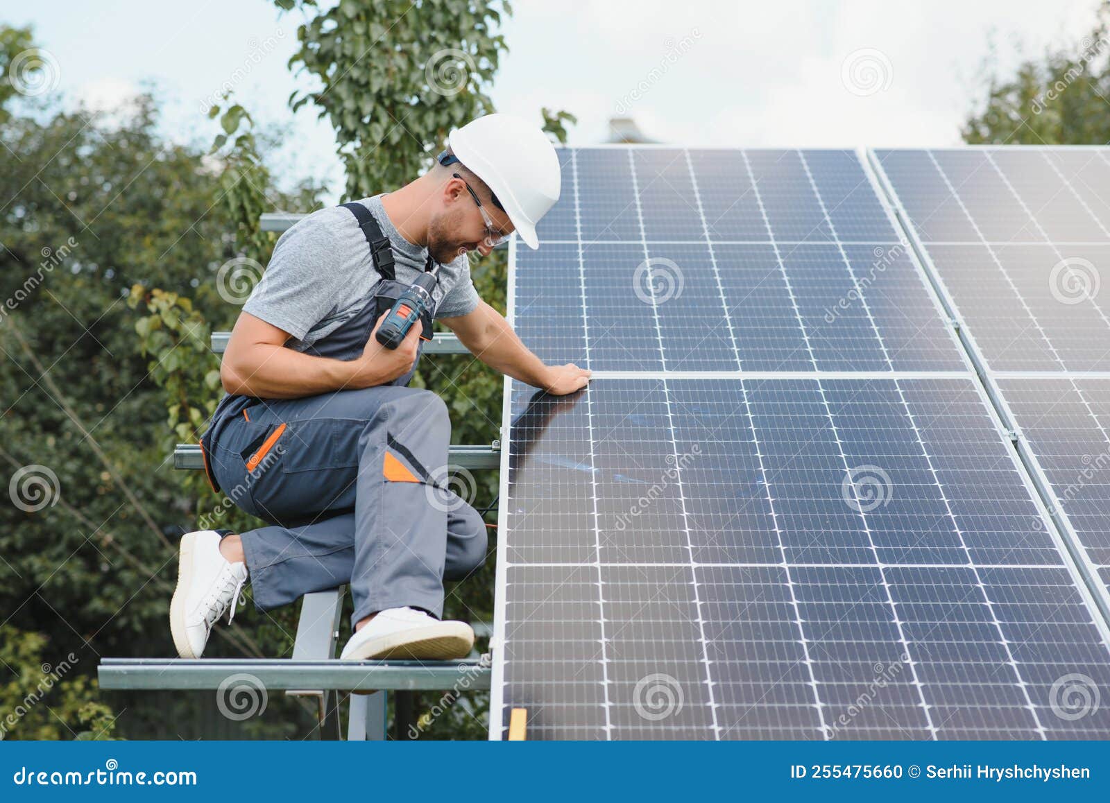 A Man Working at Solar Power Station. Stock Photo - Image of panel ...