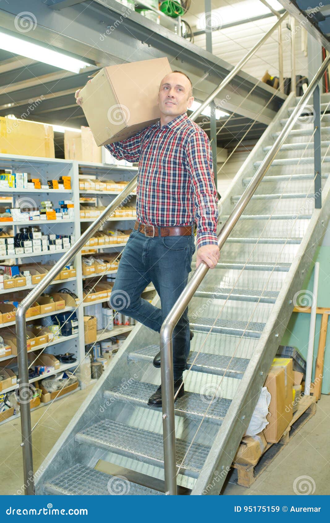 Man Working on Stairs in Warehouse Stock Image - Image of pallets ...