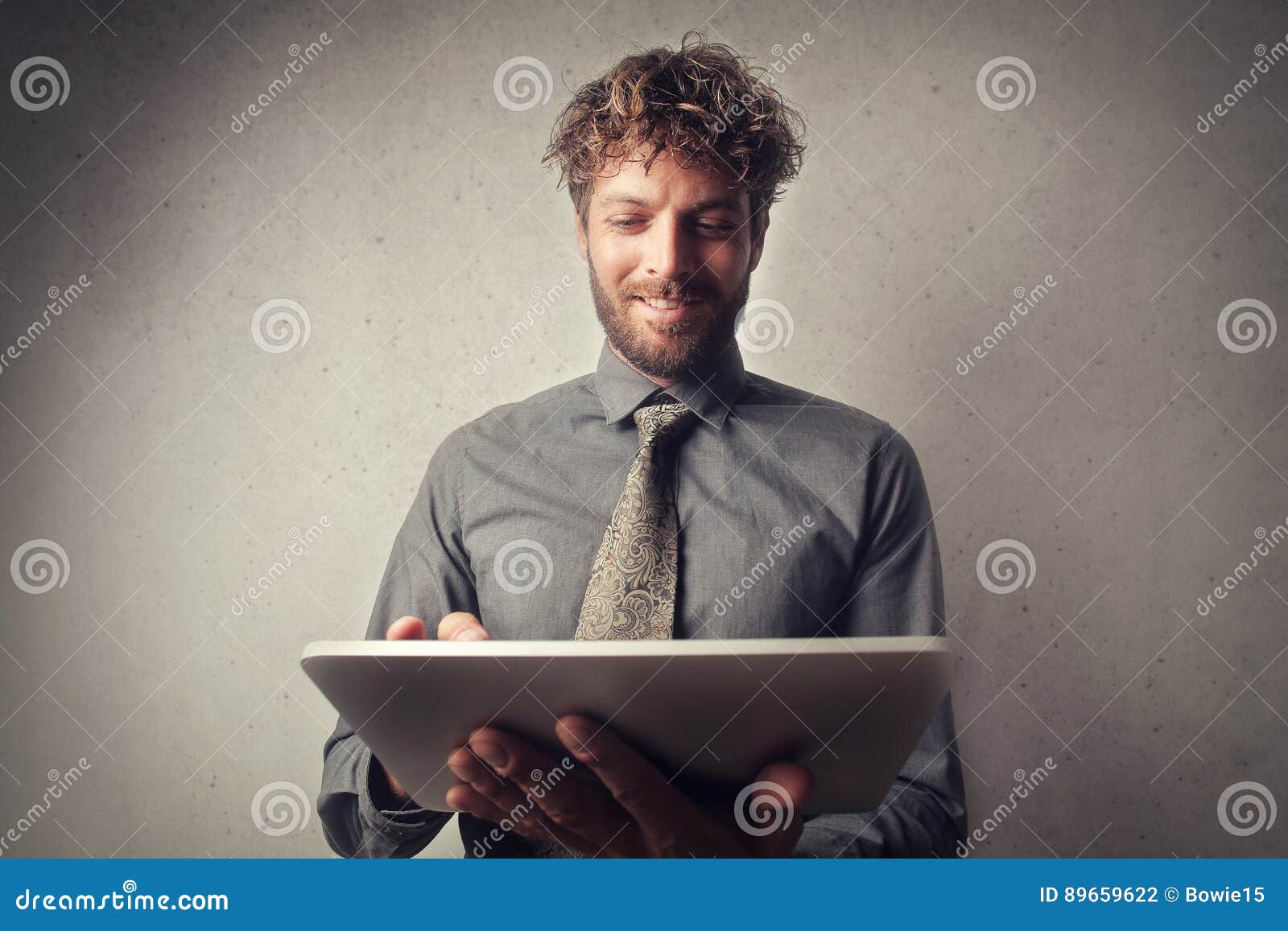 Man working on tablet stock photo. Image of tablet, postive - 89659622
