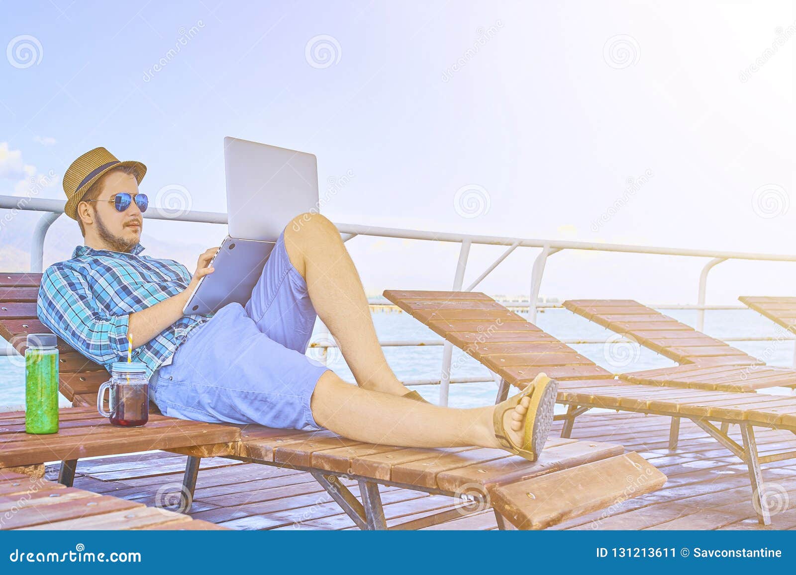 A Man is Working on Vacation. Stock Image - Image of notebook, looking ...