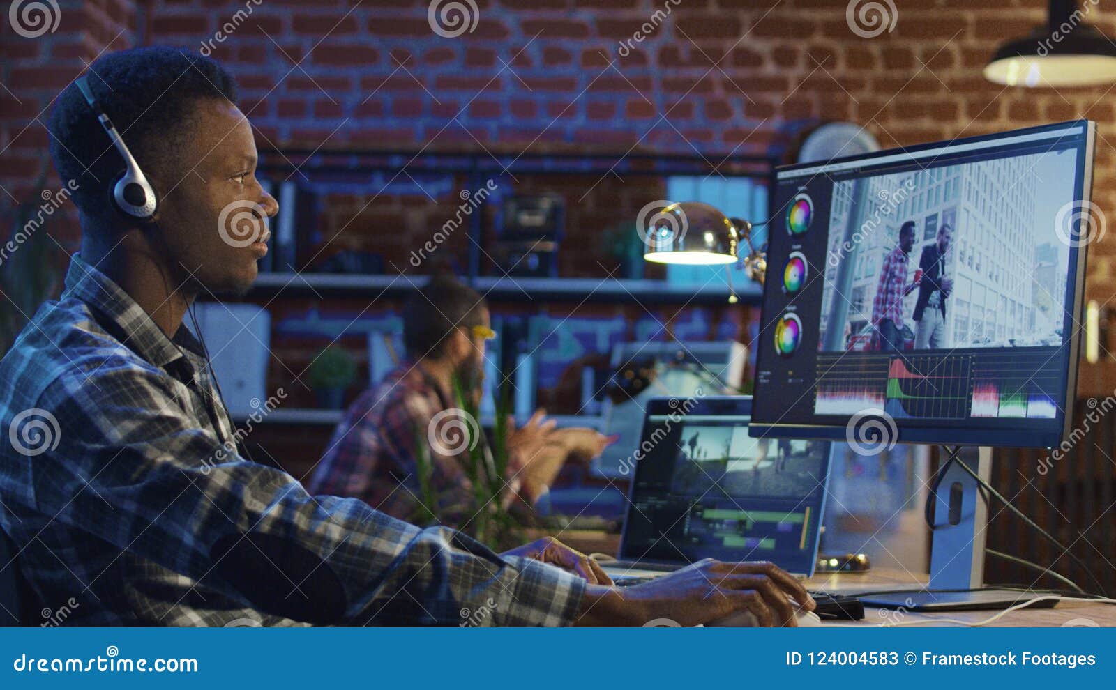 Man working on video edit stock image. Image of glasses - 124004583