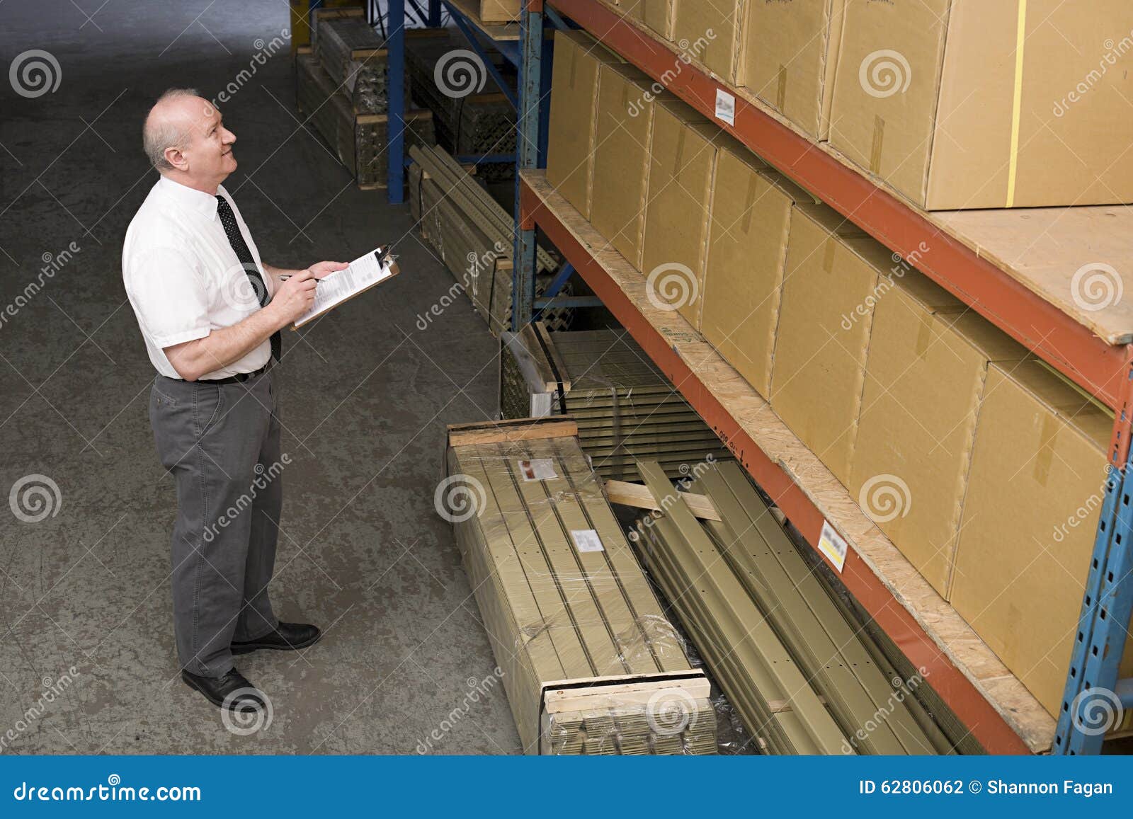 Man working in warehouse stock photo. Image of factory - 62806062