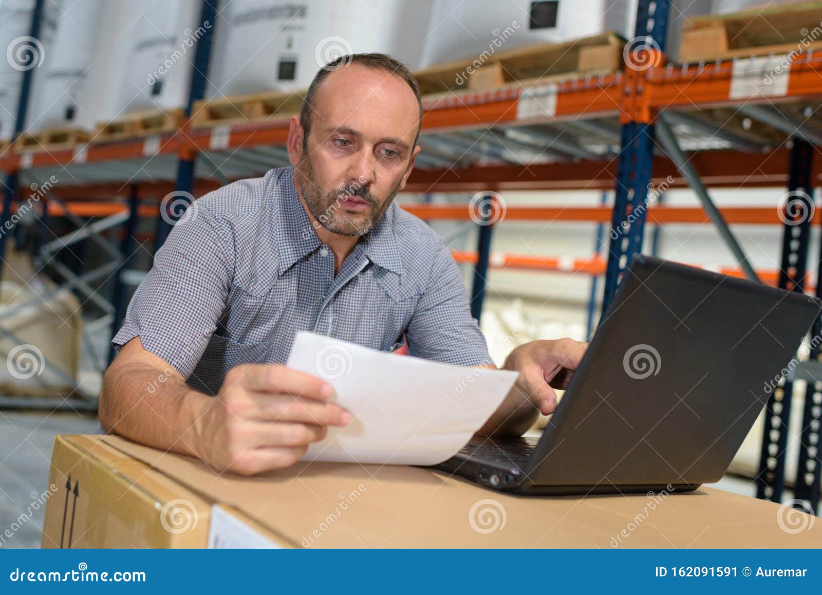 Man Working in Warehouse with Laptop Stock Image - Image of goods ...