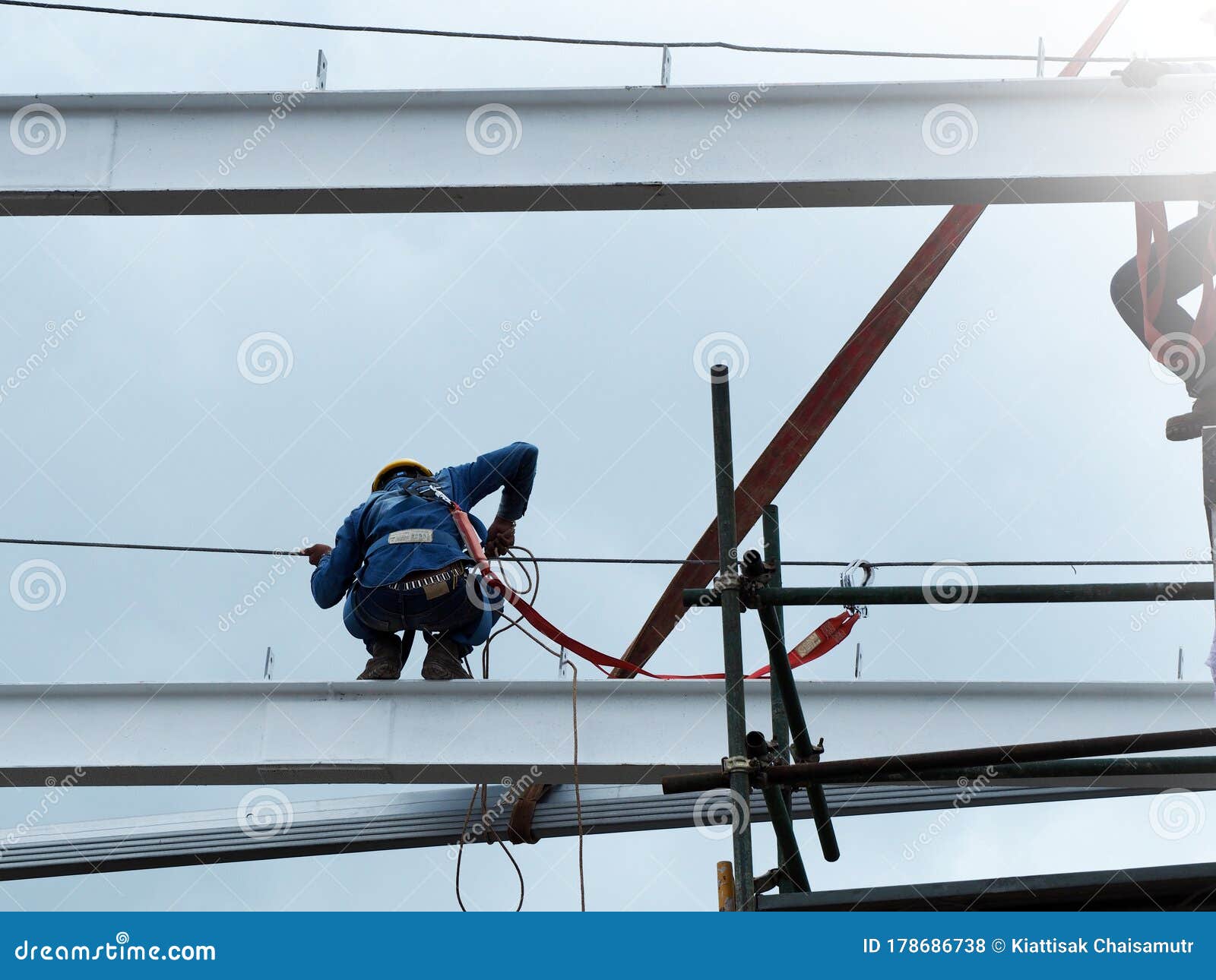 Man Working on the Working at Height on Construction Stock Photo ...