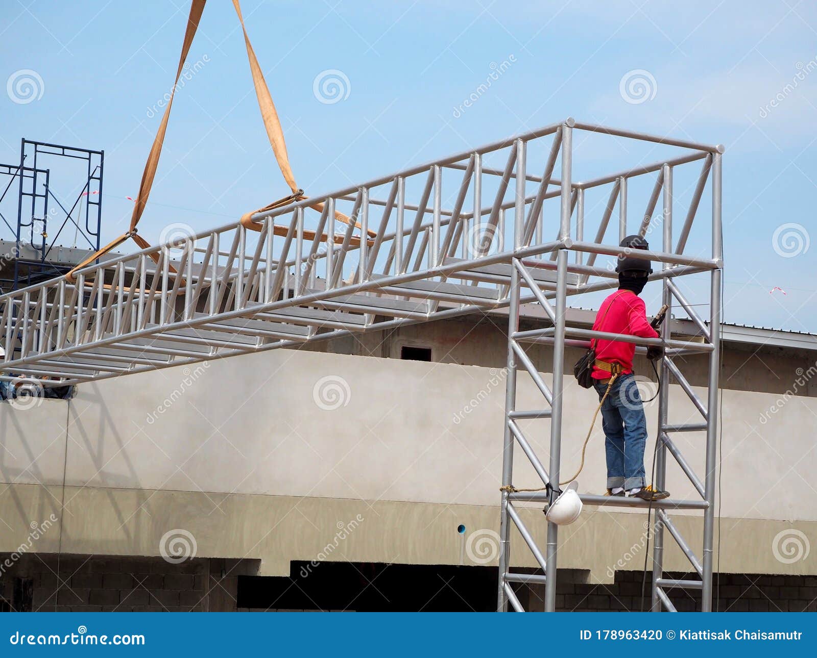 Man Working on the Working at Height on Construction Stock Photo ...