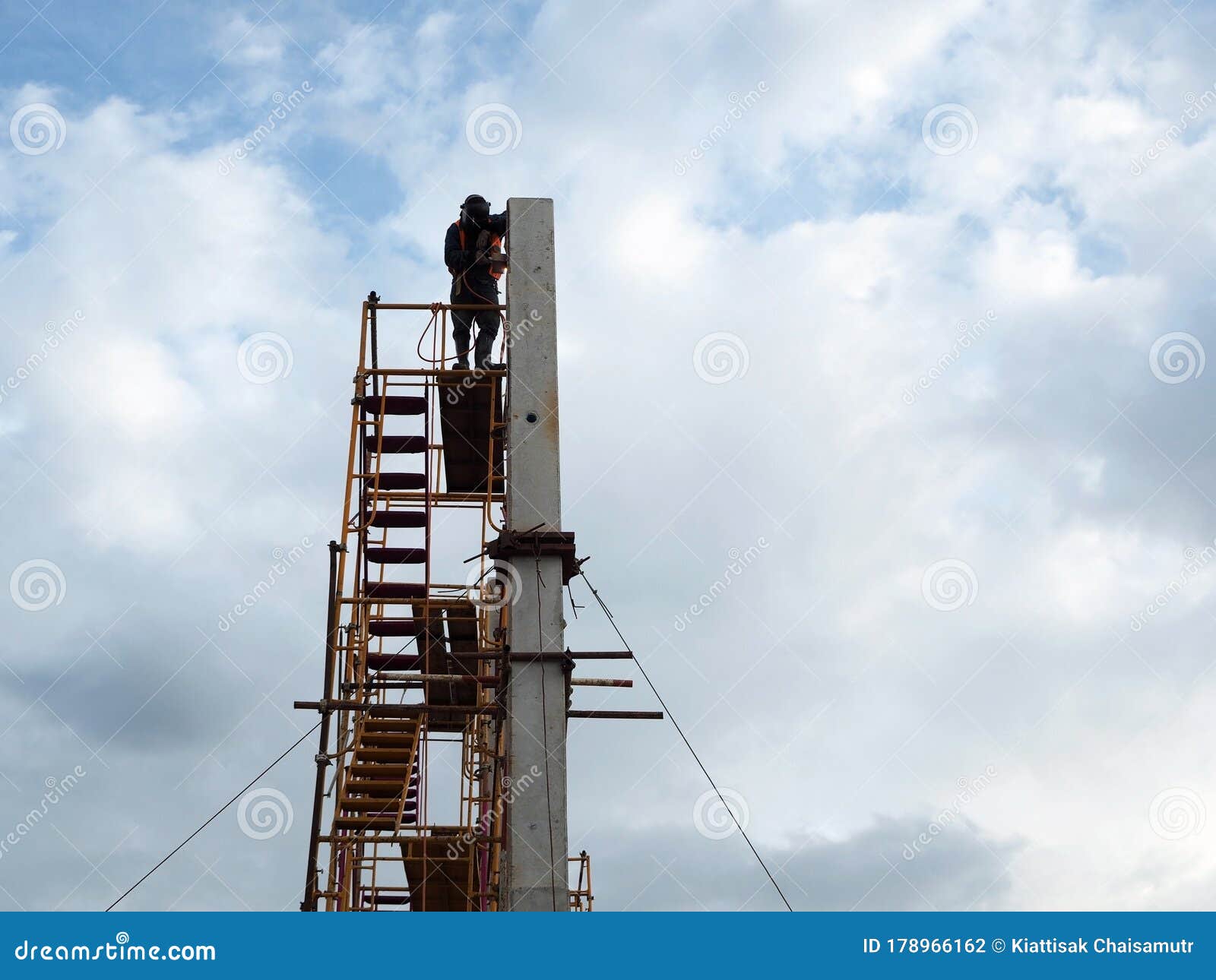 Man Working on the Working at Height on Construction Stock Photo ...