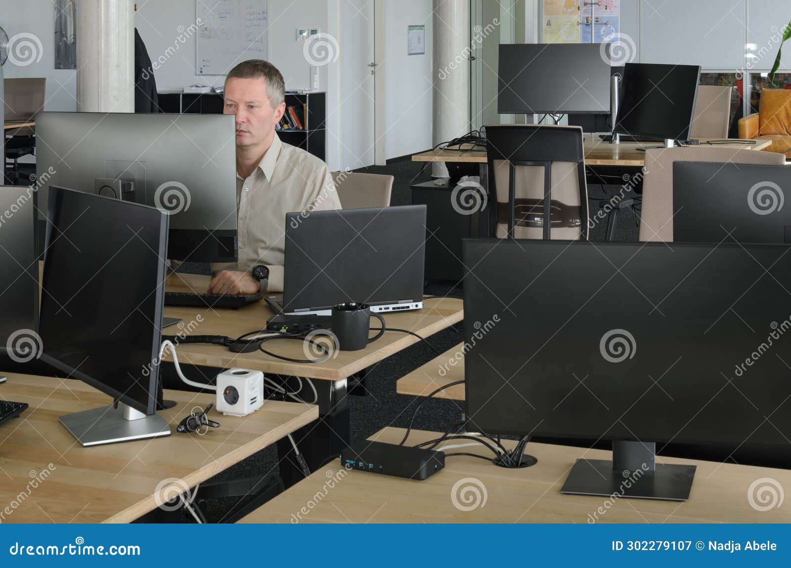 Man Works at Computer in an it Office Stock Image - Image of minimalism ...