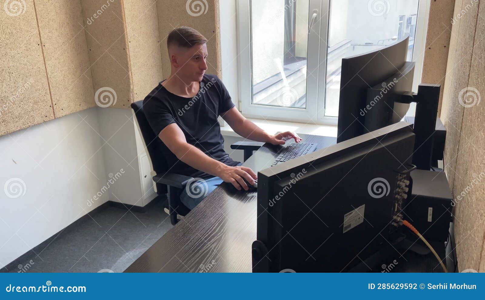 Man Works at a Computer Types Text on the Keyboard and Clicks the ...
