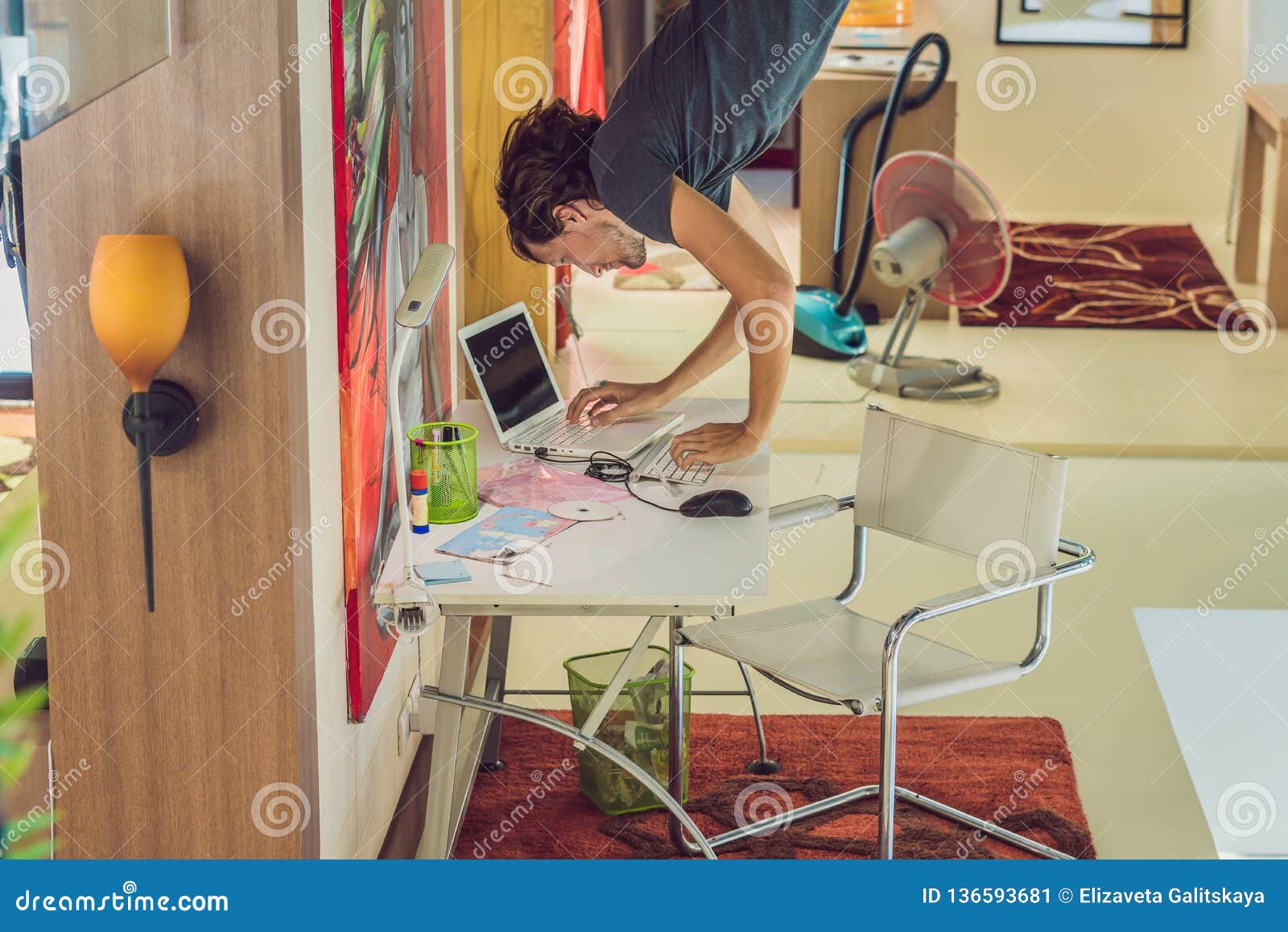 A Man Works at the Computer Upside Down Stock Image - Image of carefree ...