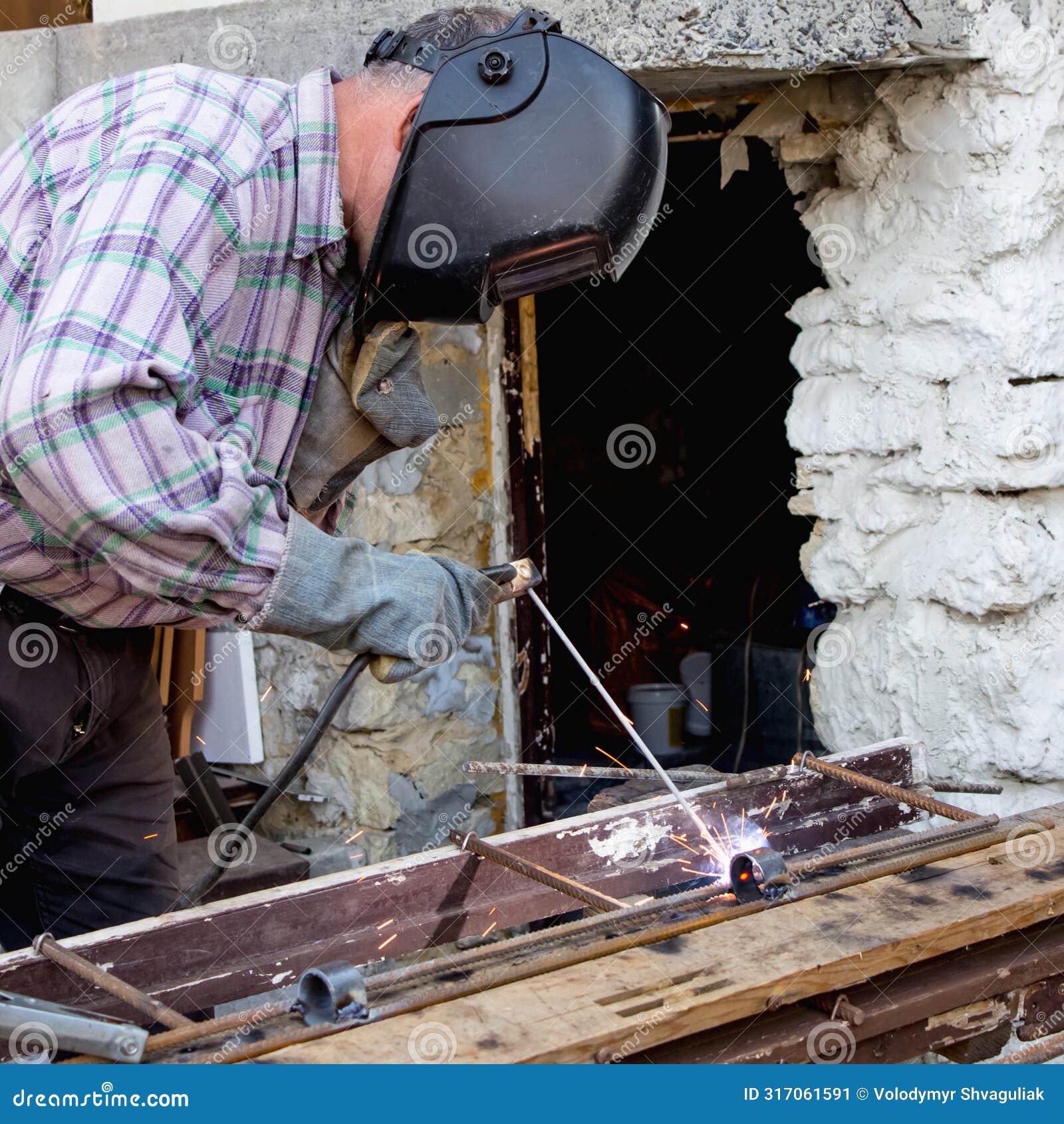 Work in the Industry. a Man Works with a Welding Machine Stock Image ...