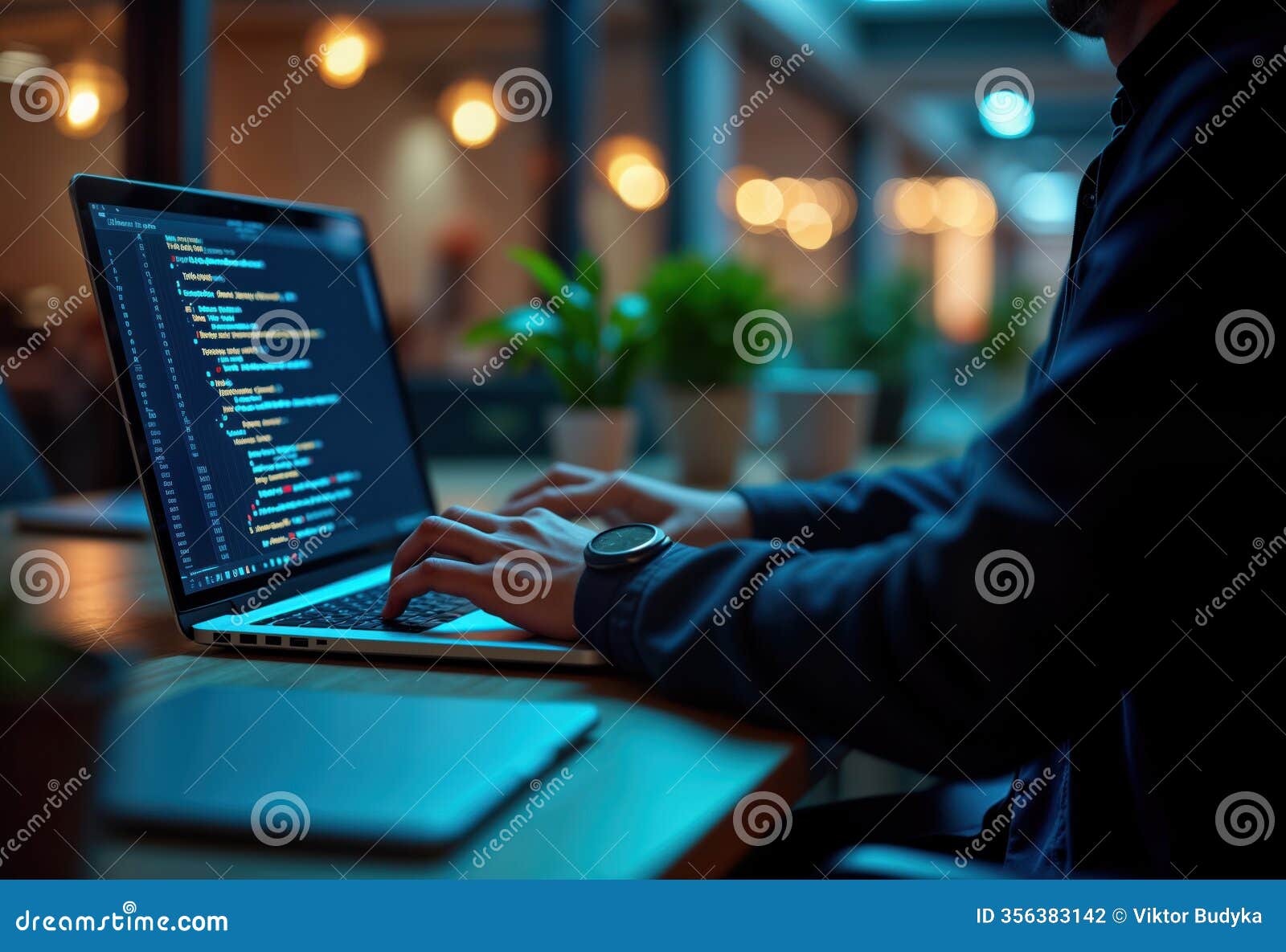 Man Works Late Night on Laptop in Office. Coding on Laptop Screen ...