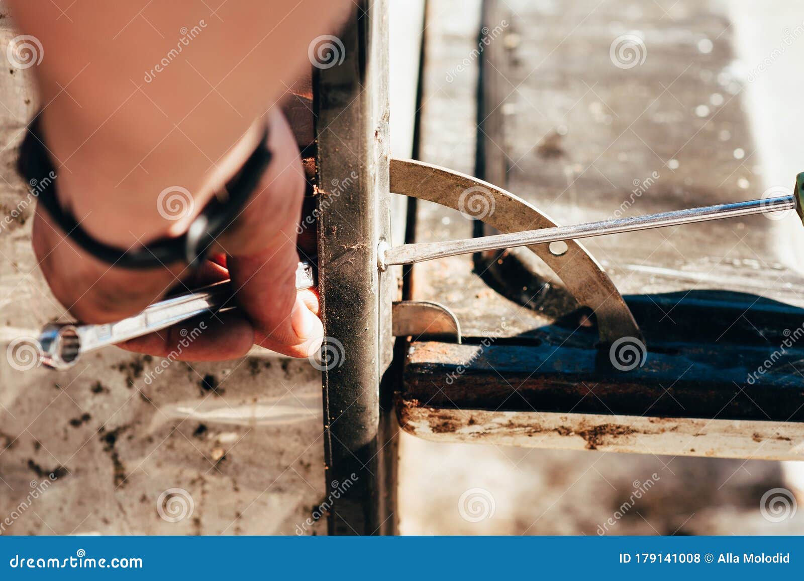 Man Works with Metal and Tools Stock Photo - Image of safety, stains ...