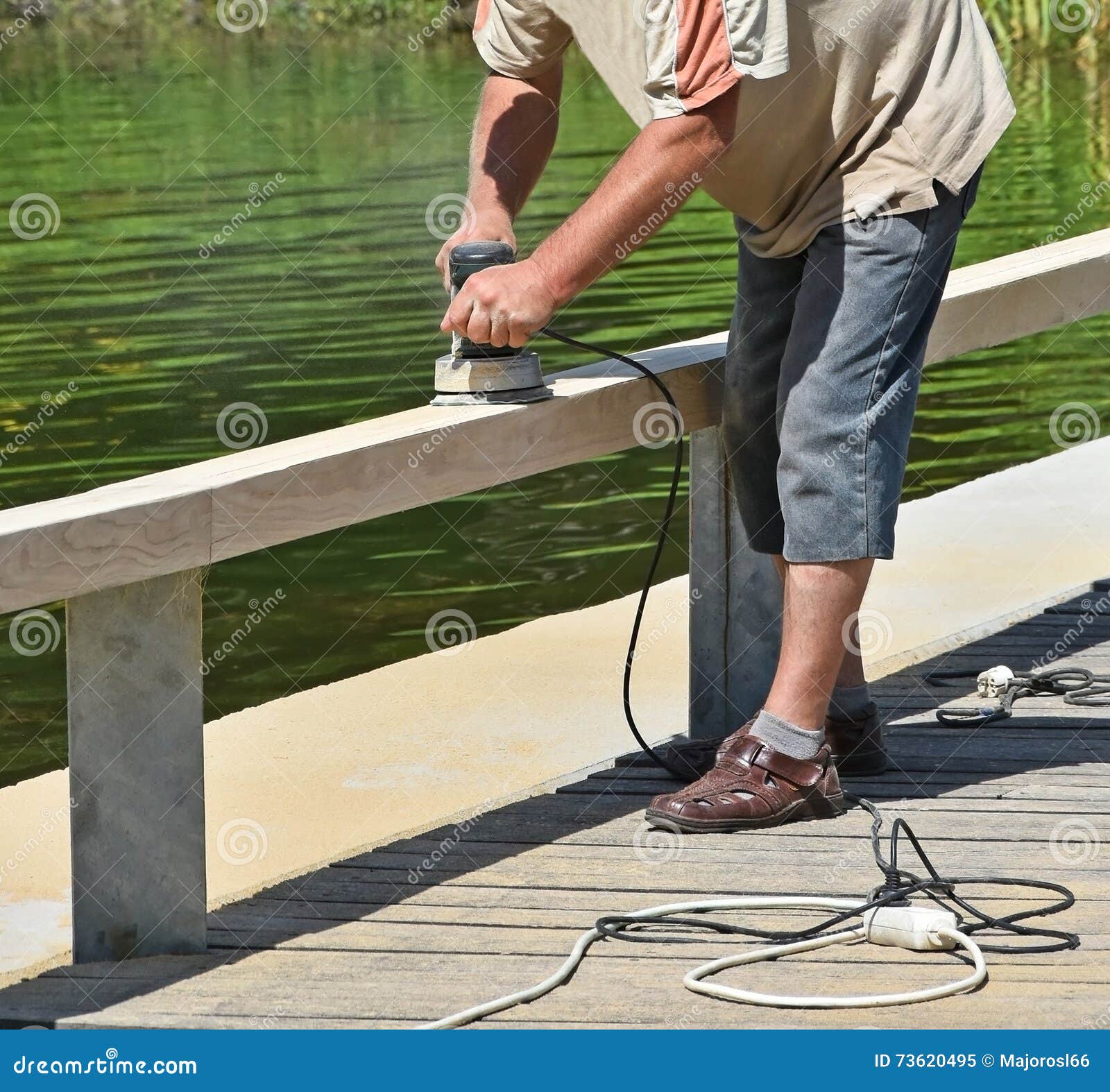 Man works outdoors stock image. Image of activity, building - 73620495