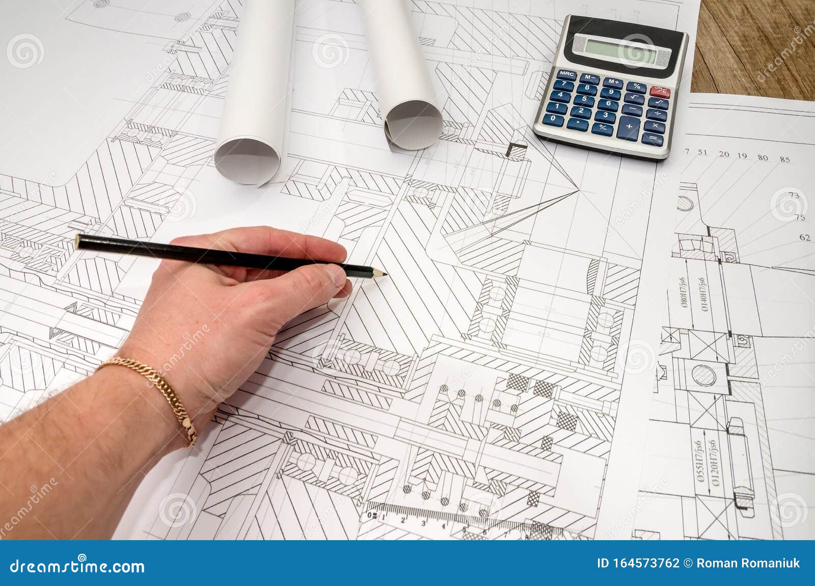 Man Works with the Technical Drawing, Machine Parts Stock Photo - Image ...