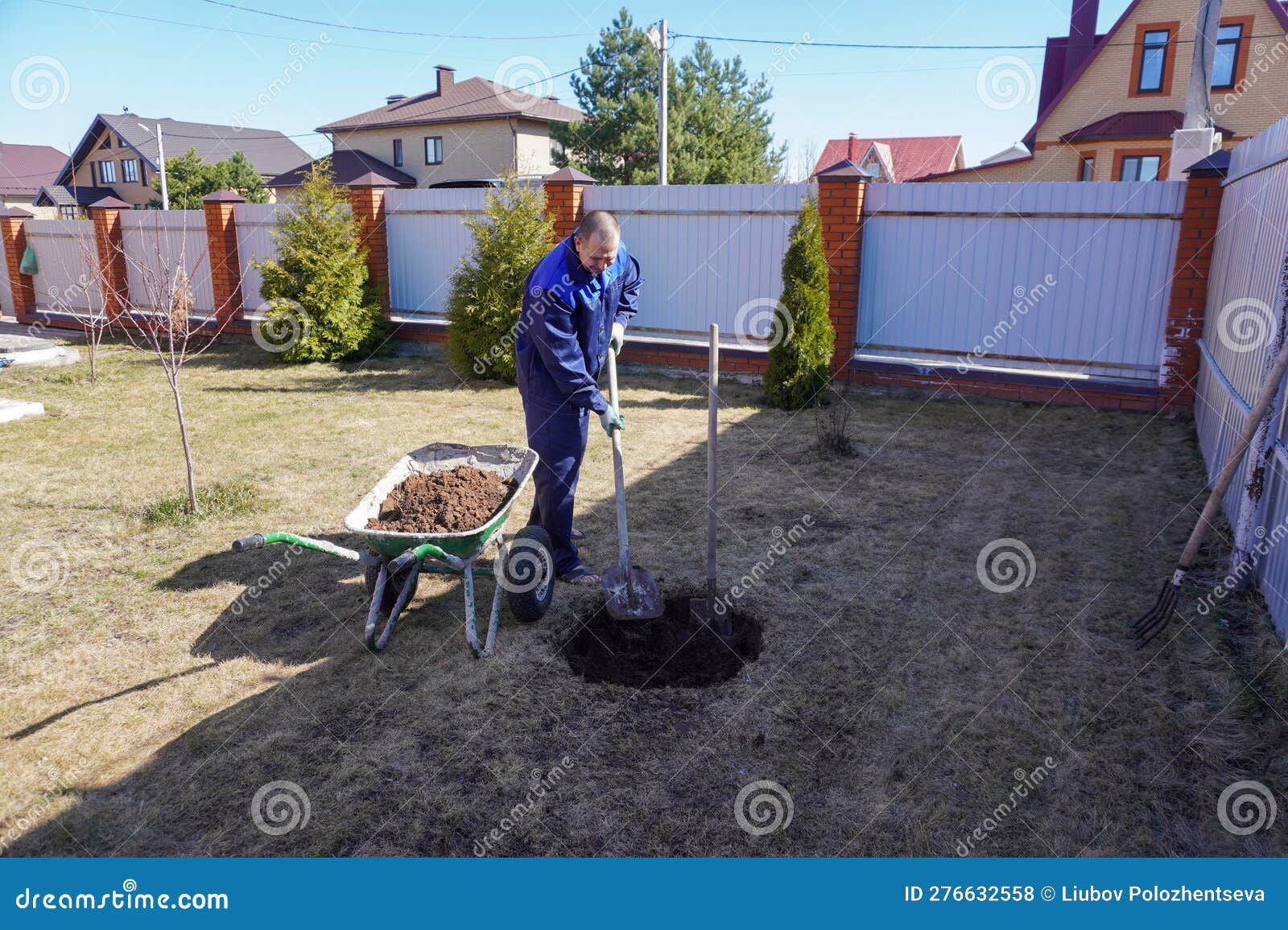 A Man Works in a Vegetable Garden in Early Spring Stock Photo - Image ...