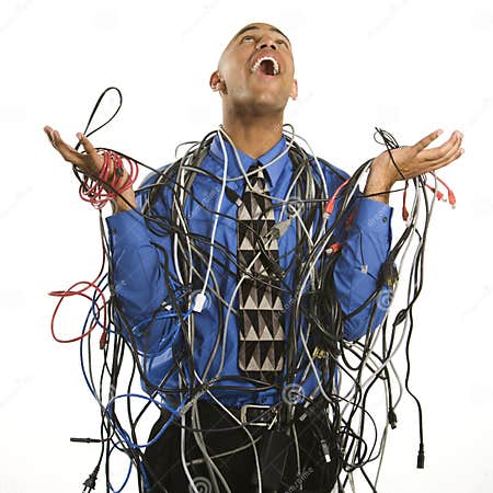 Man wrapped in cables. stock photo. Image of colour, person - 2425862