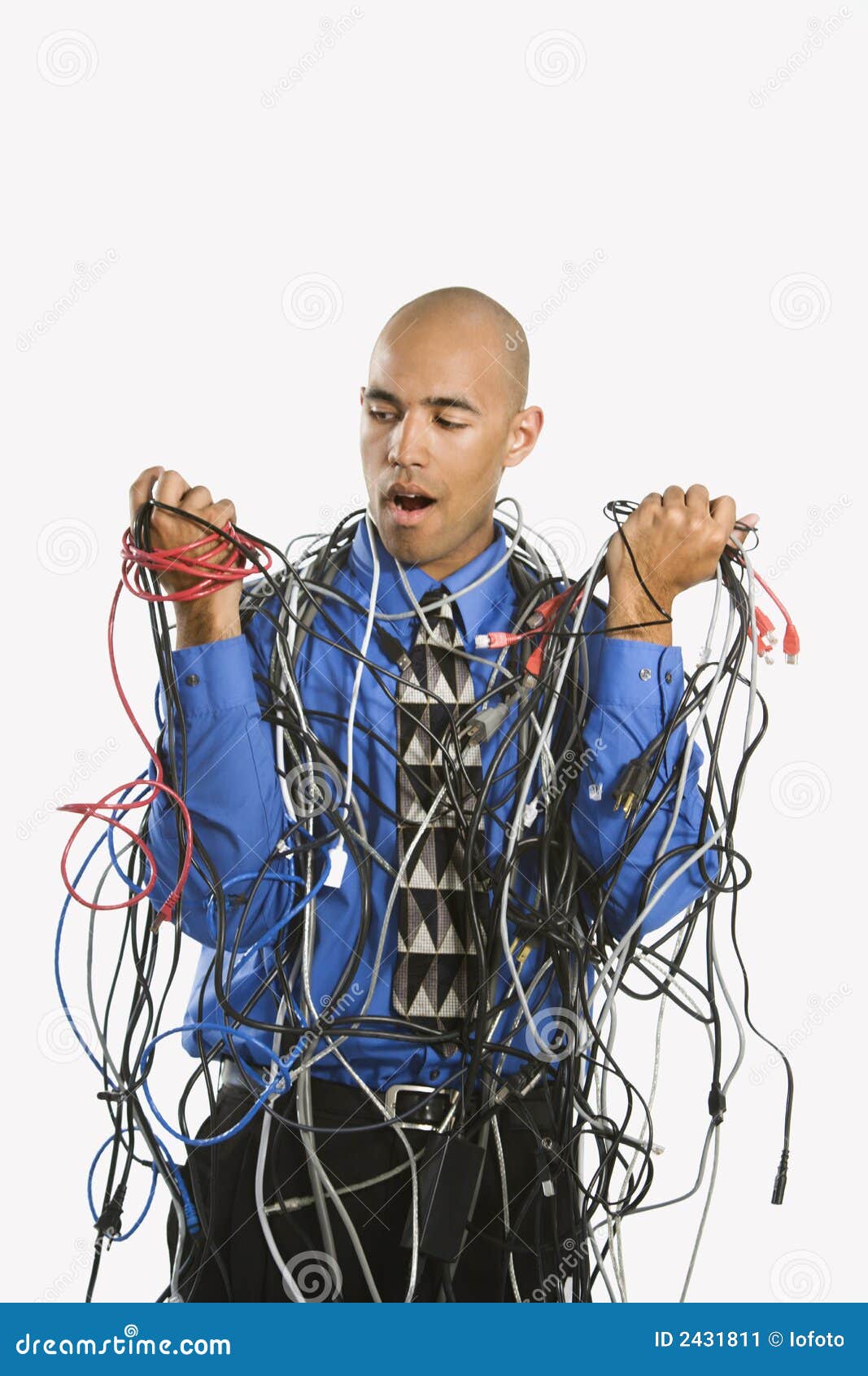 Man wrapped in cables. stock image. Image of african, confused - 2431811