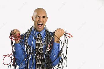 Man wrapped in cables. stock photo. Image of high, confused - 2431812