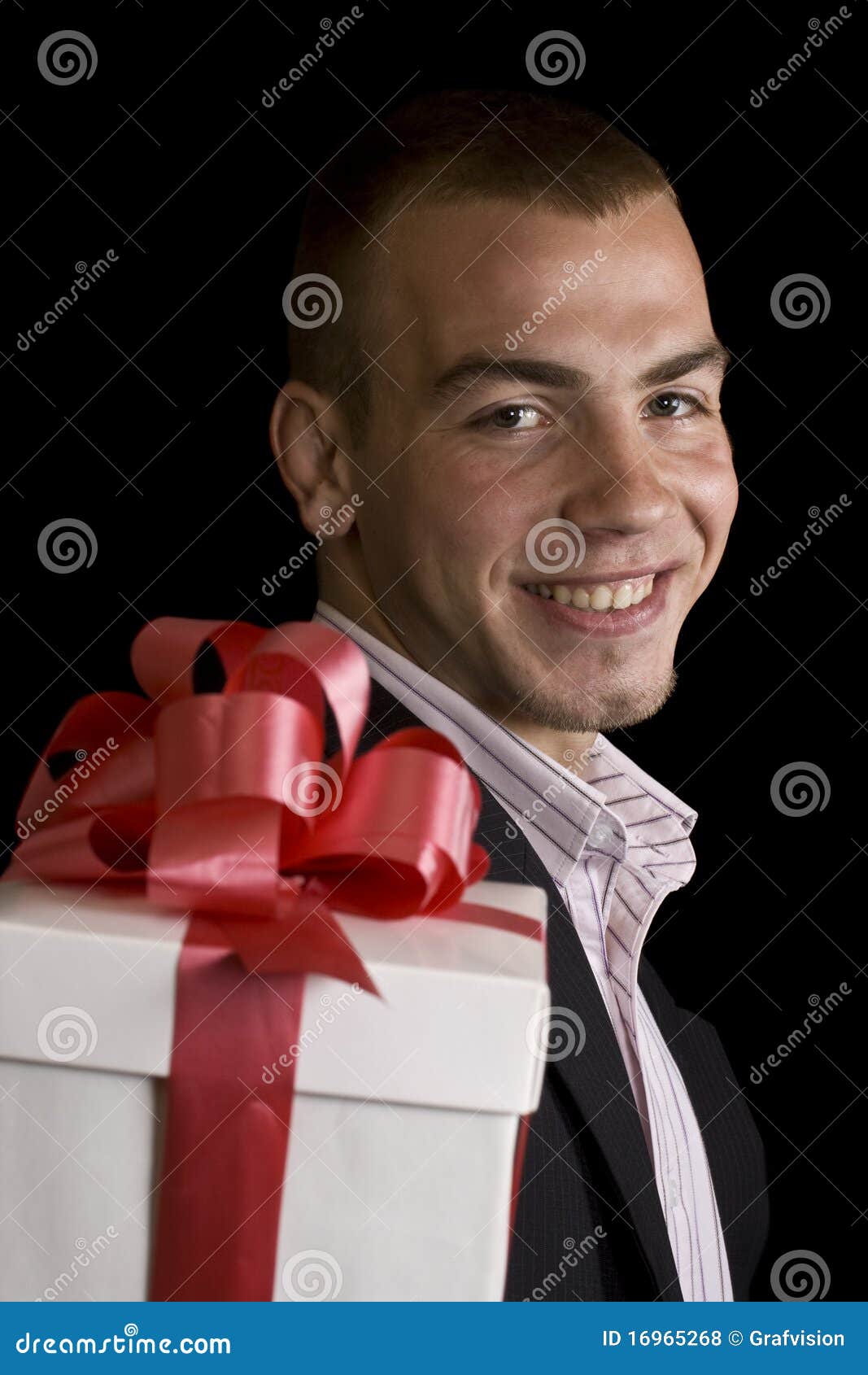 Man with a Wrapped Gift Box Stock Photo - Image of holding, color: 16965268