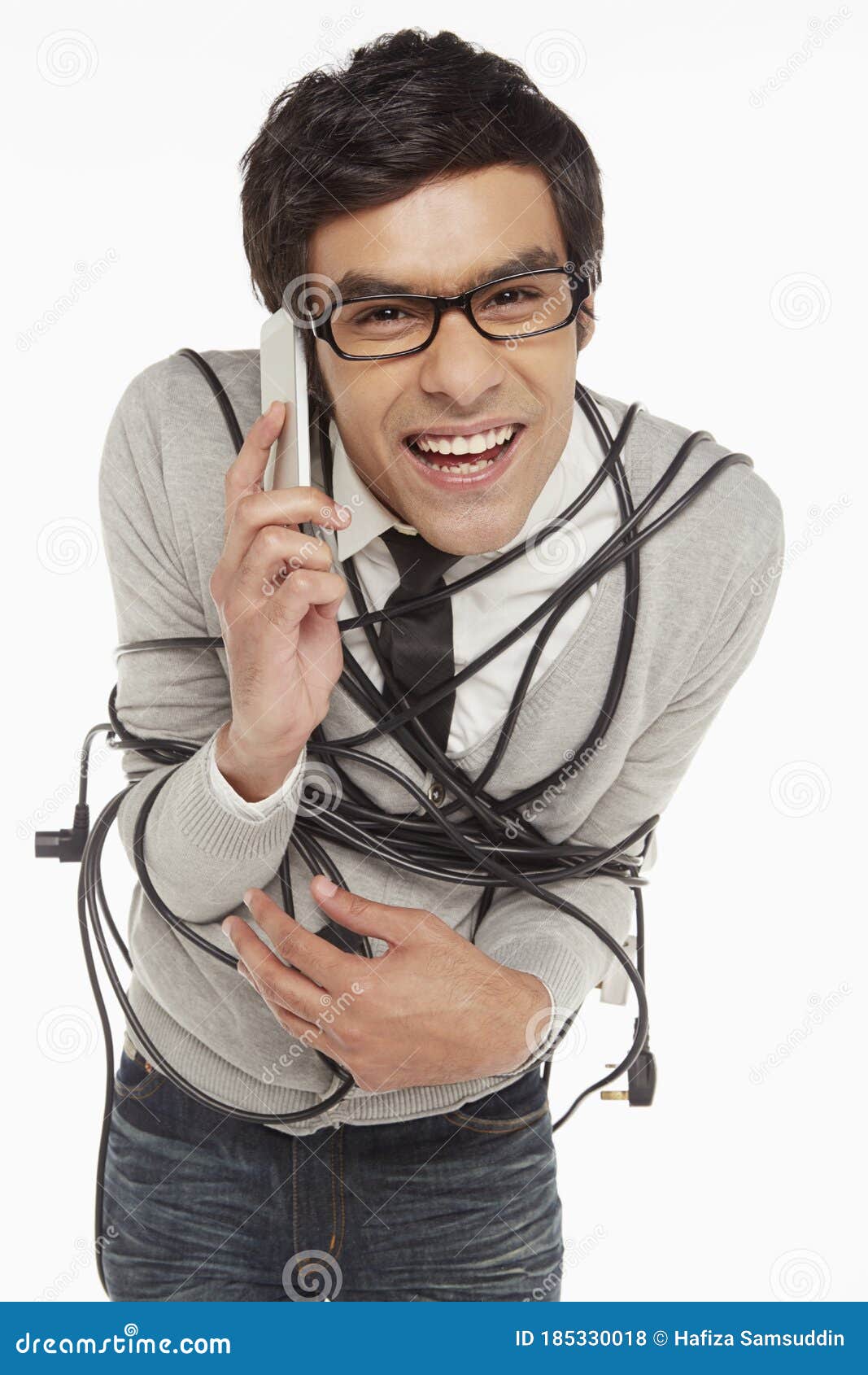 Man Wrapped in a Tangled Cable Talking on the Phone Stock Photo - Image ...