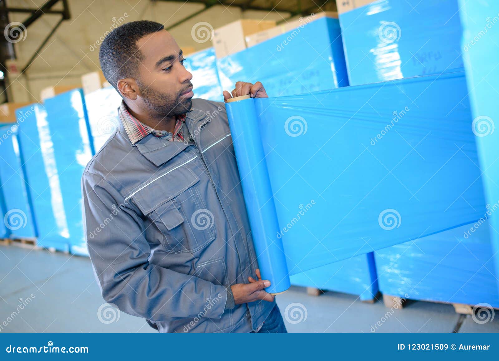 Man wrapping the container stock image. Image of protection - 123021509