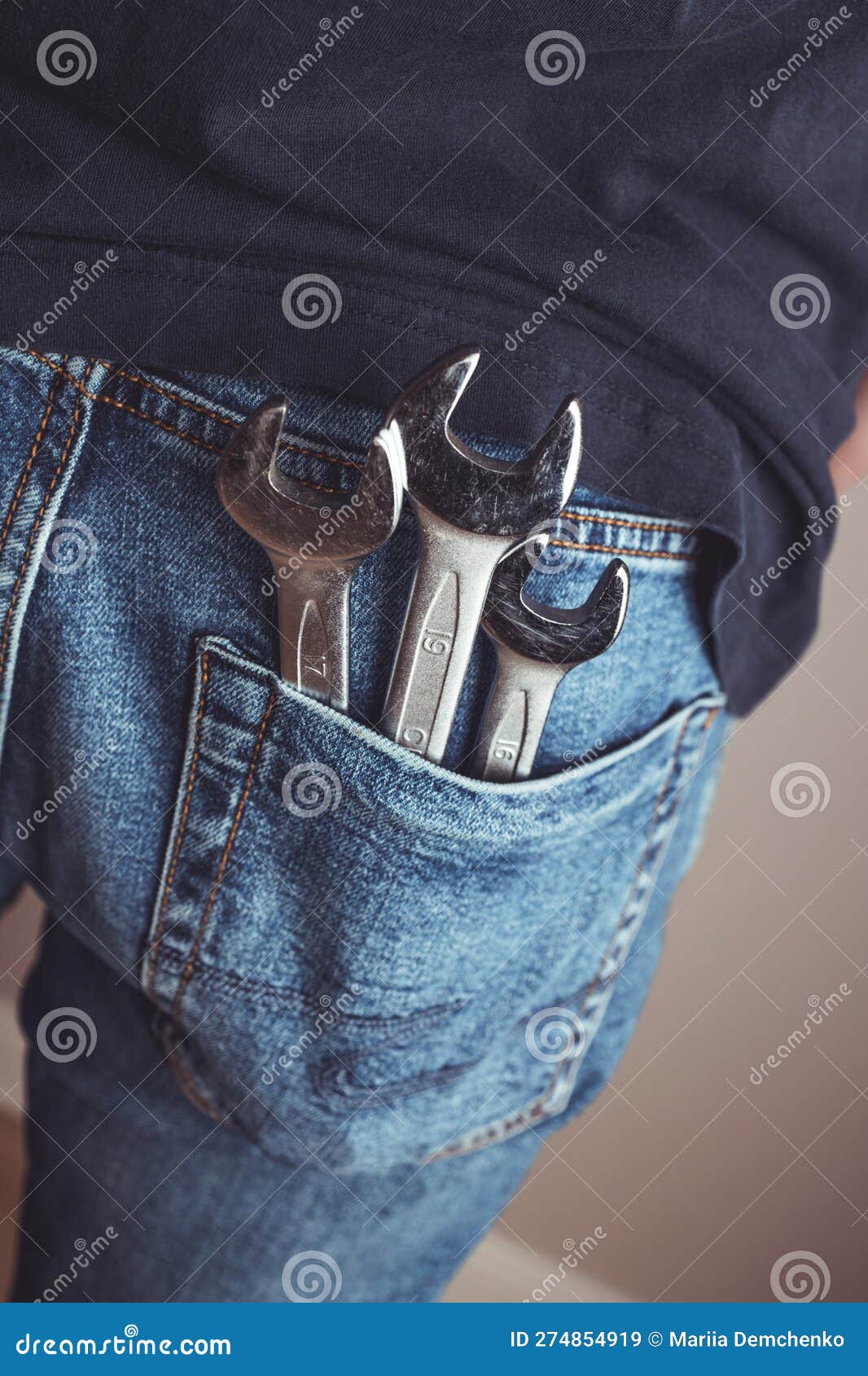 Man with Wrenches in Back Pocket of His Jeans Stock Image - Image of ...