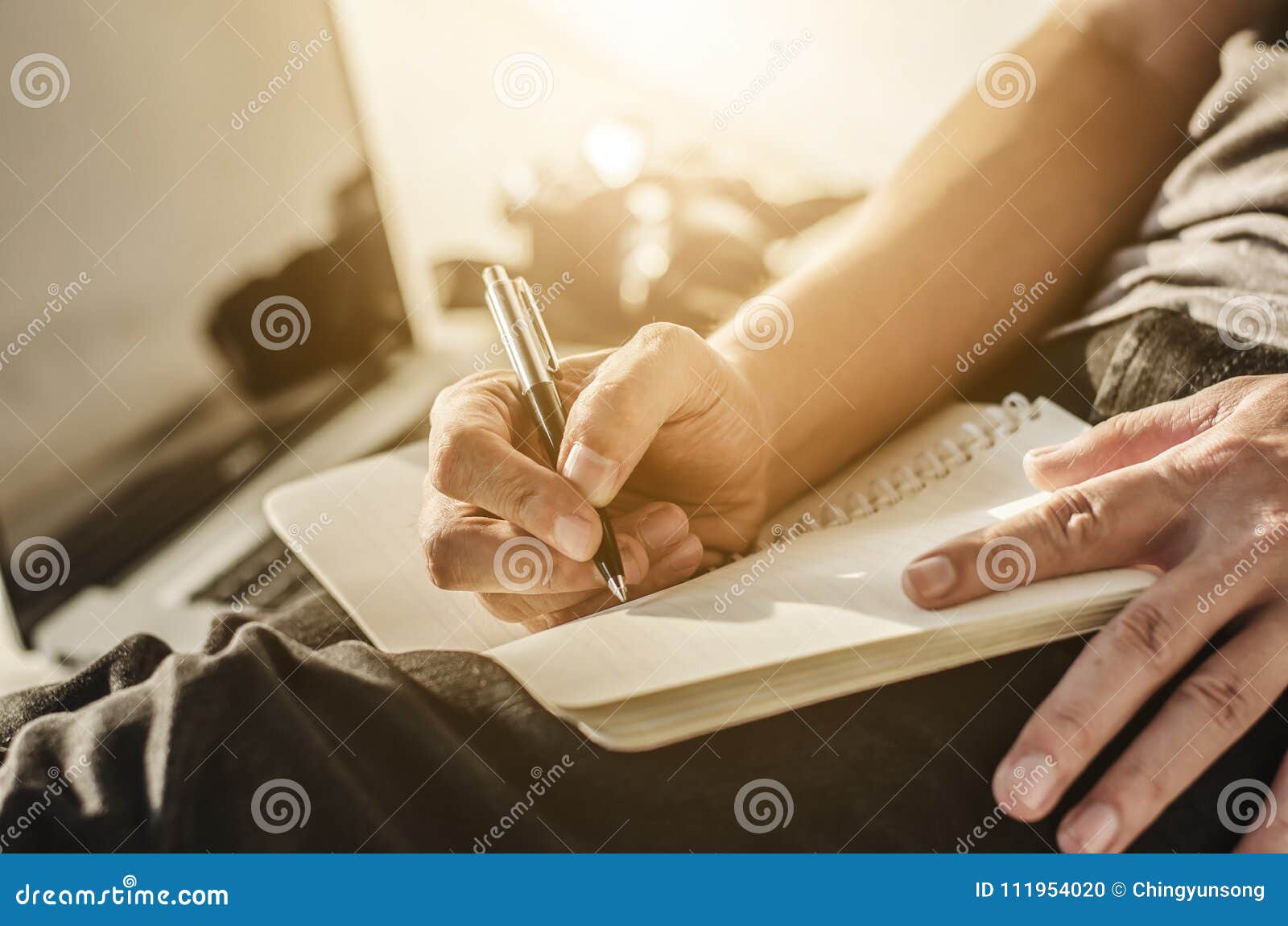 Man Write Pen on Notebook and Work on Laptop, a Man Relax Working from ...