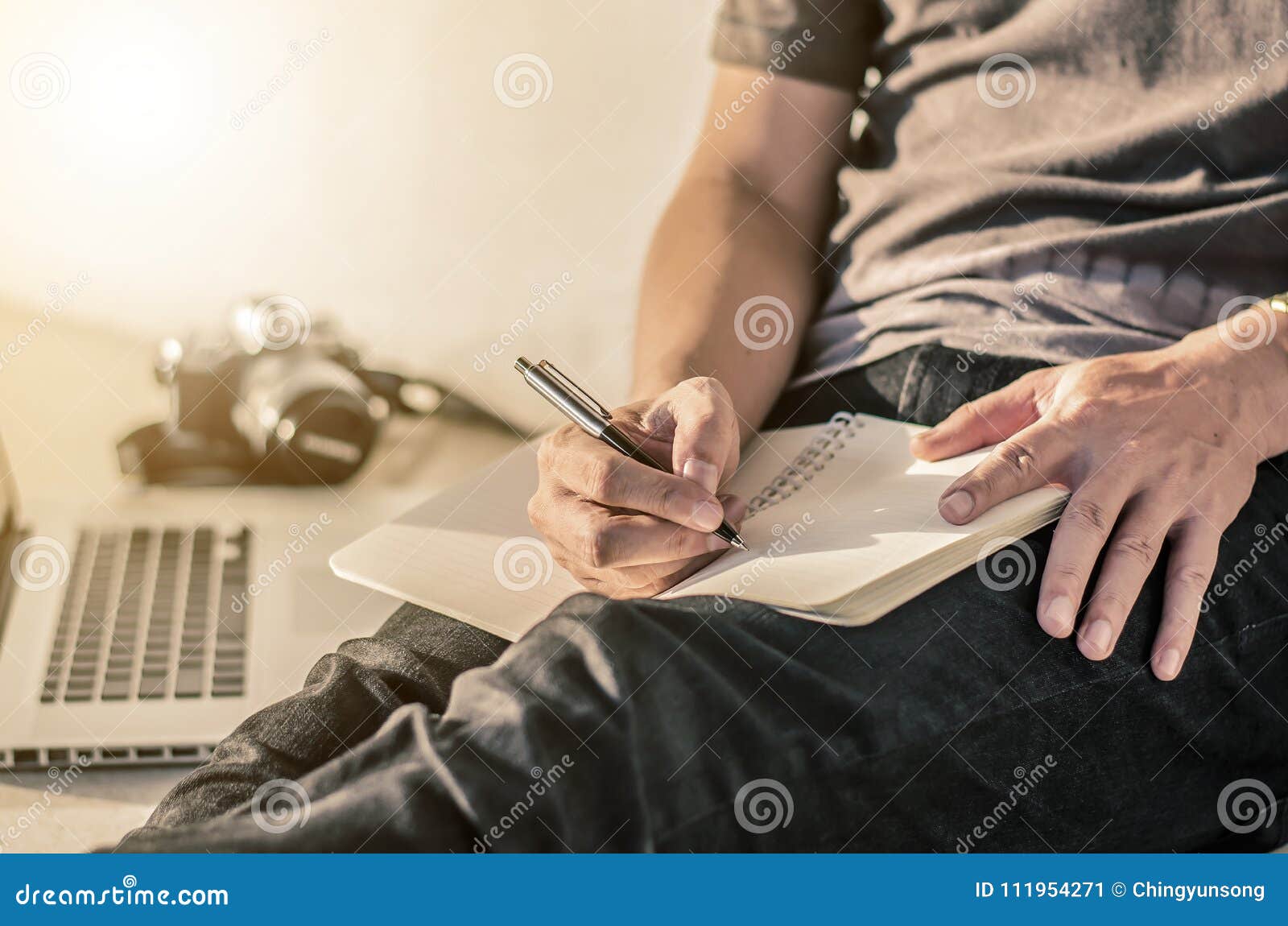 Man Write Pen on Notebook and Work on Laptop, a Man Relax Working from ...