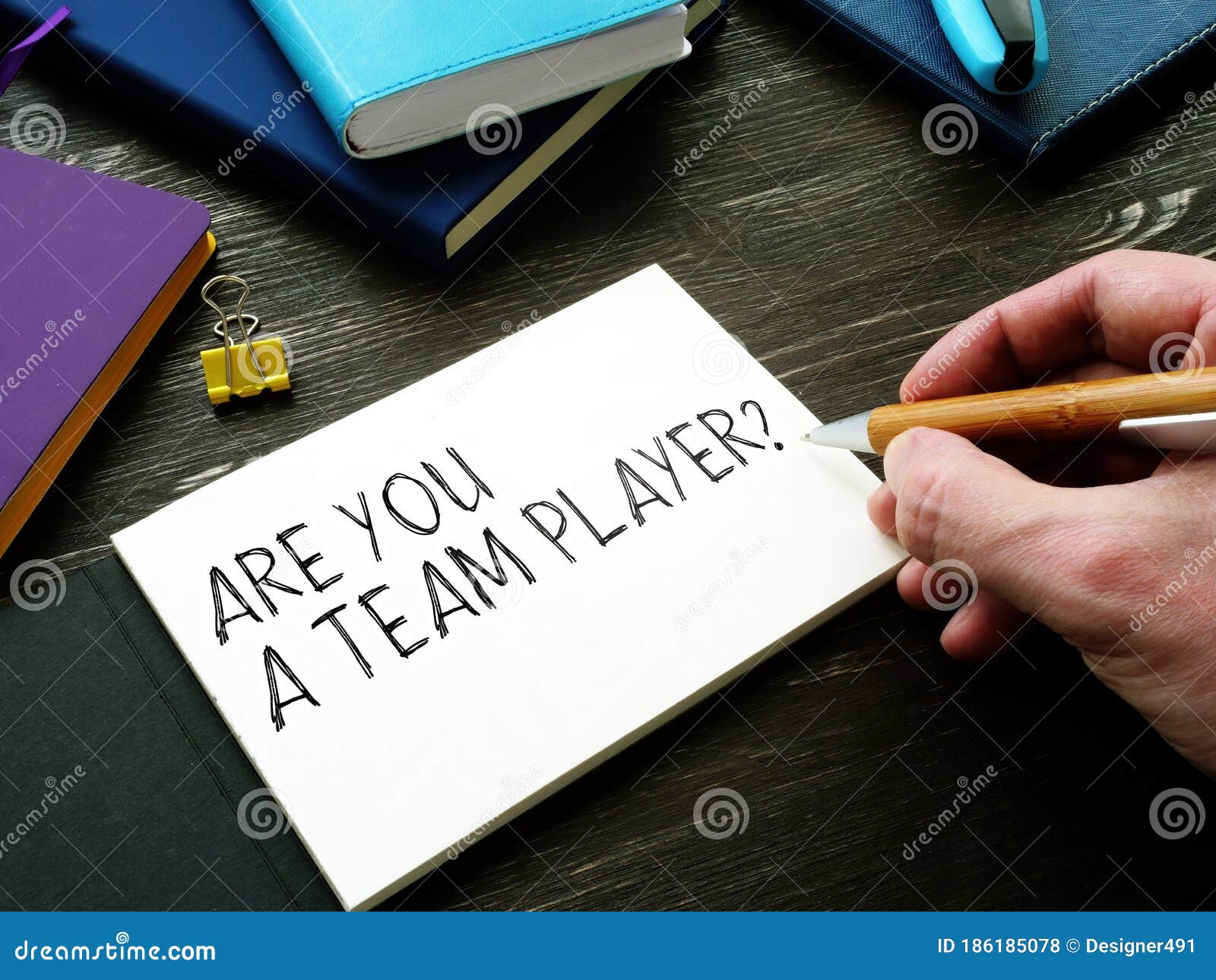 Man Writes are You a Team Player Question. Teamwork Concept. Stock ...