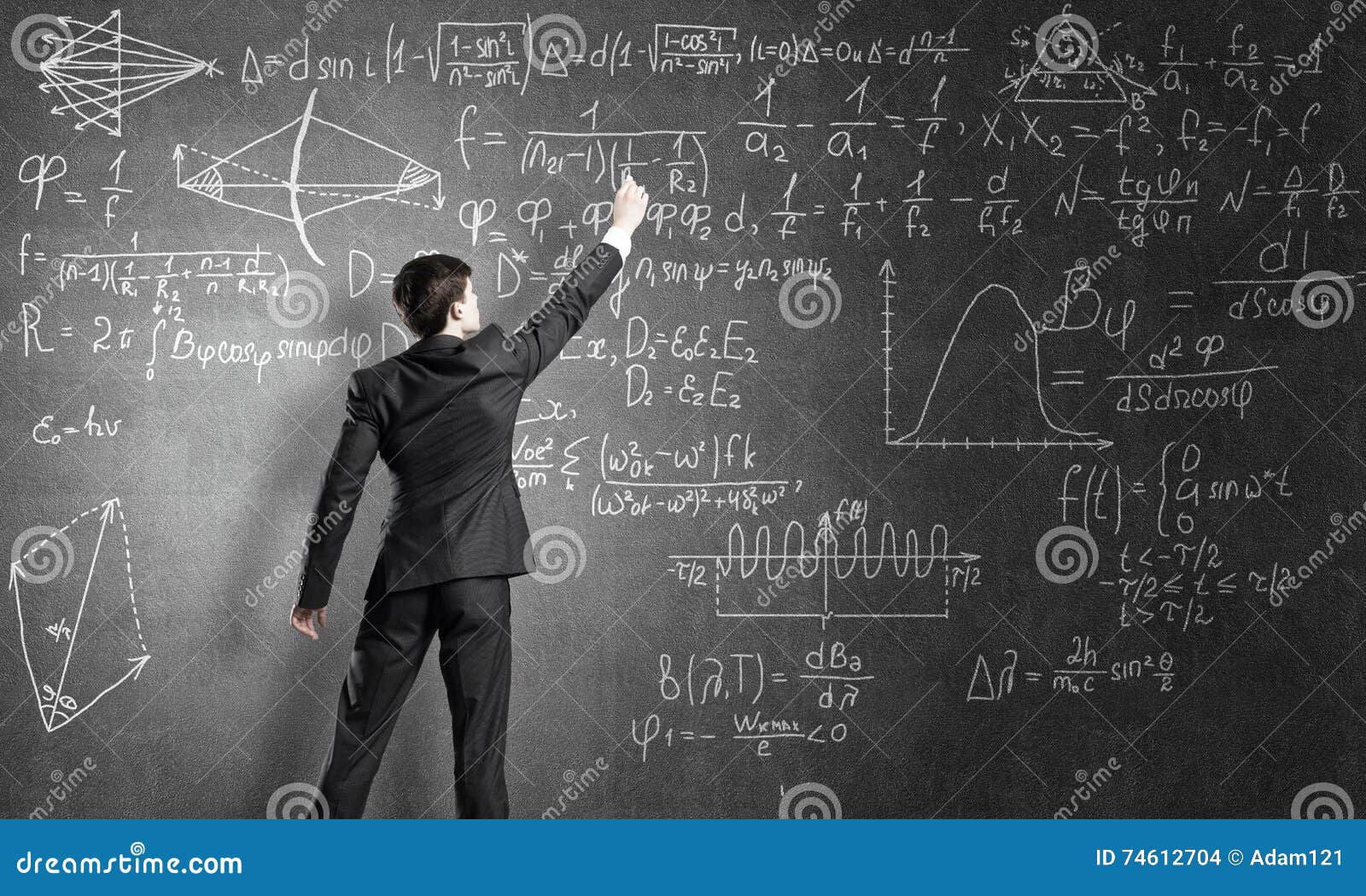 Man writing on blackboard stock photo. Image of maths - 74612704
