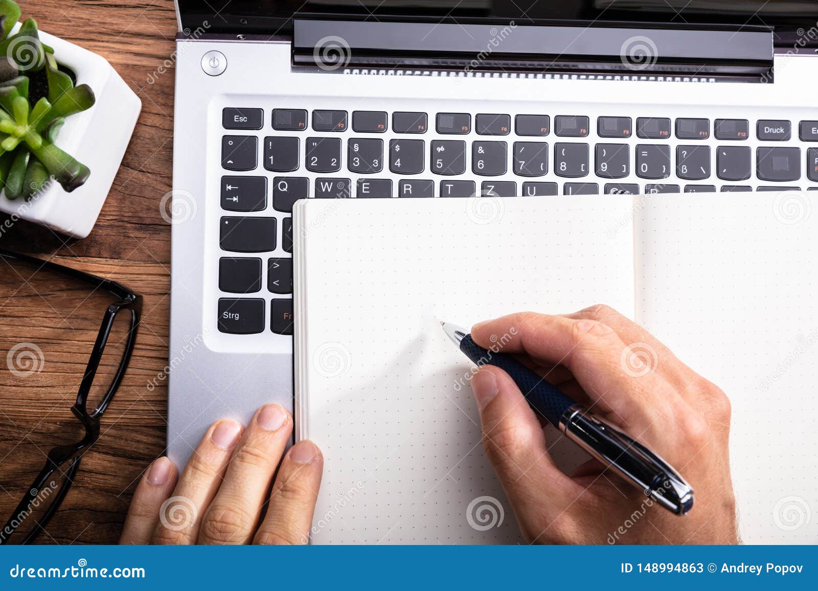 Man Writing on Blank Notepad Stock Image - Image of glass, coffee ...