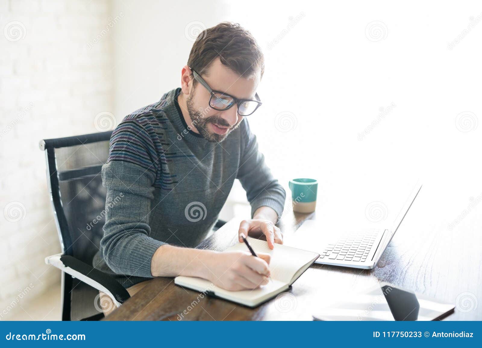 Man writing book at home stock image. Image of author - 117750233