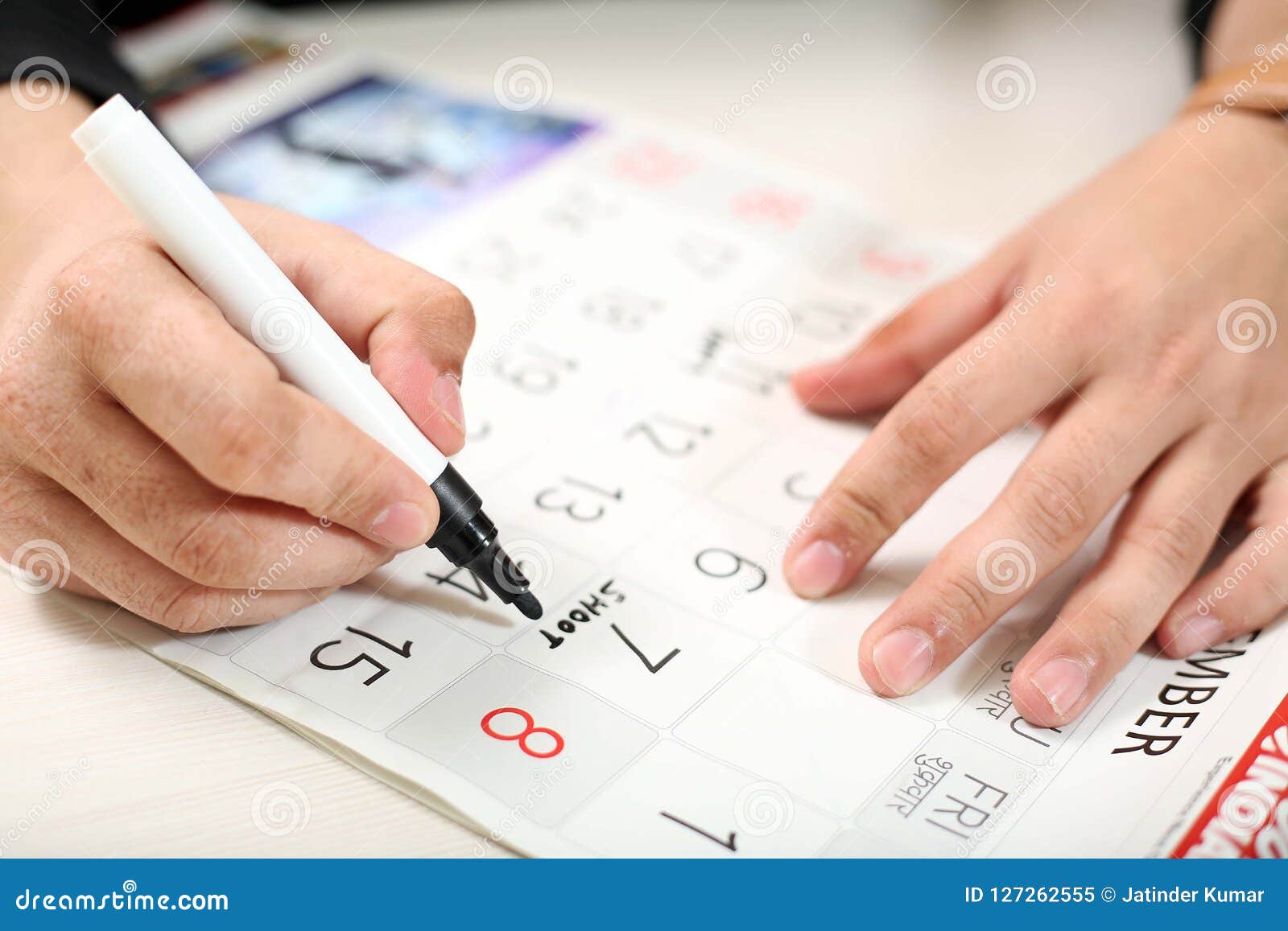 Man is Writing on Calendar with Marker Stock Image - Image of date ...