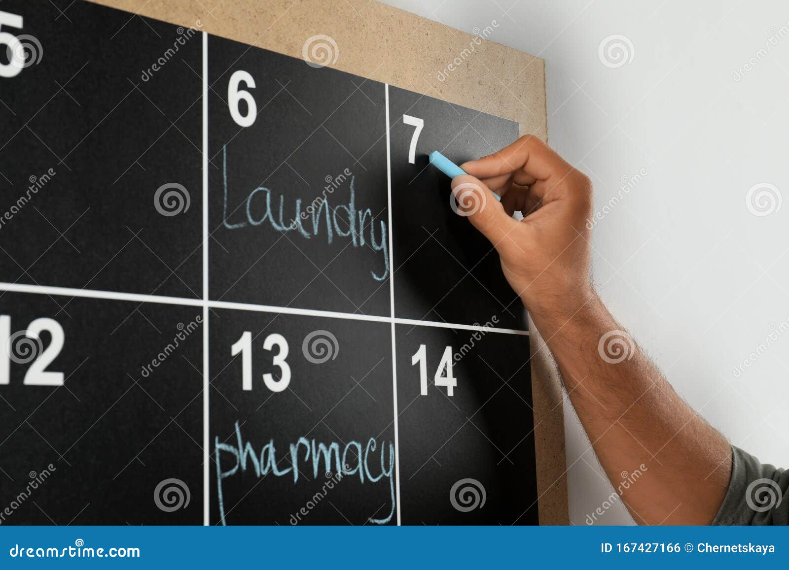 Man Writing with Chalk on Board Calendar, Closeup Stock Photo - Image ...