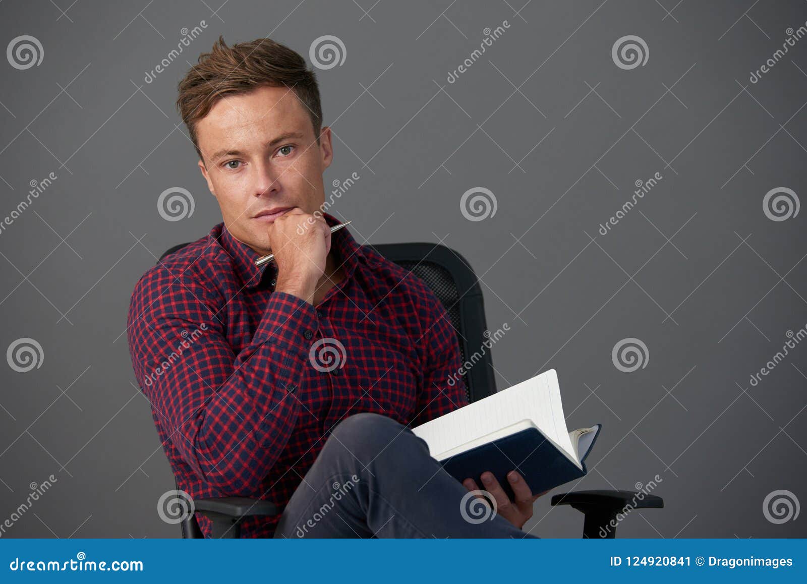 Man writing in diary stock image. Image of young, confident - 124920841
