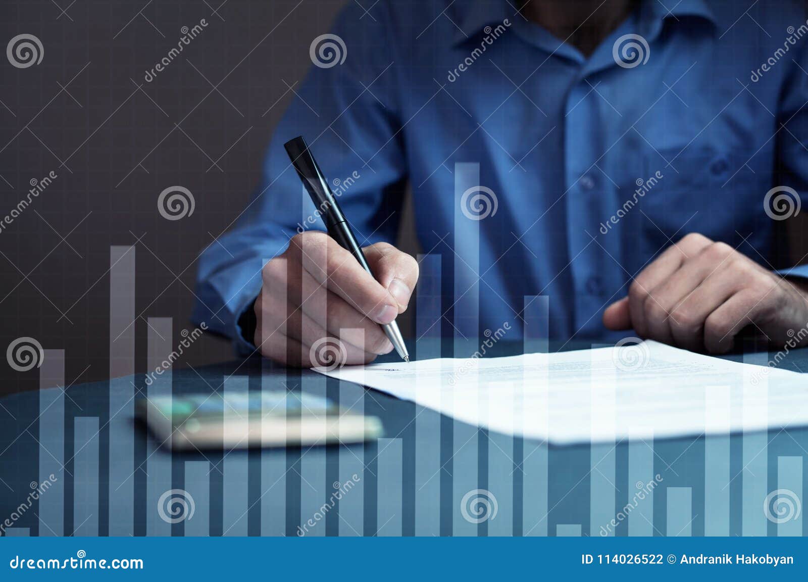 Man writing on document. stock photo. Image of statistic - 114026522