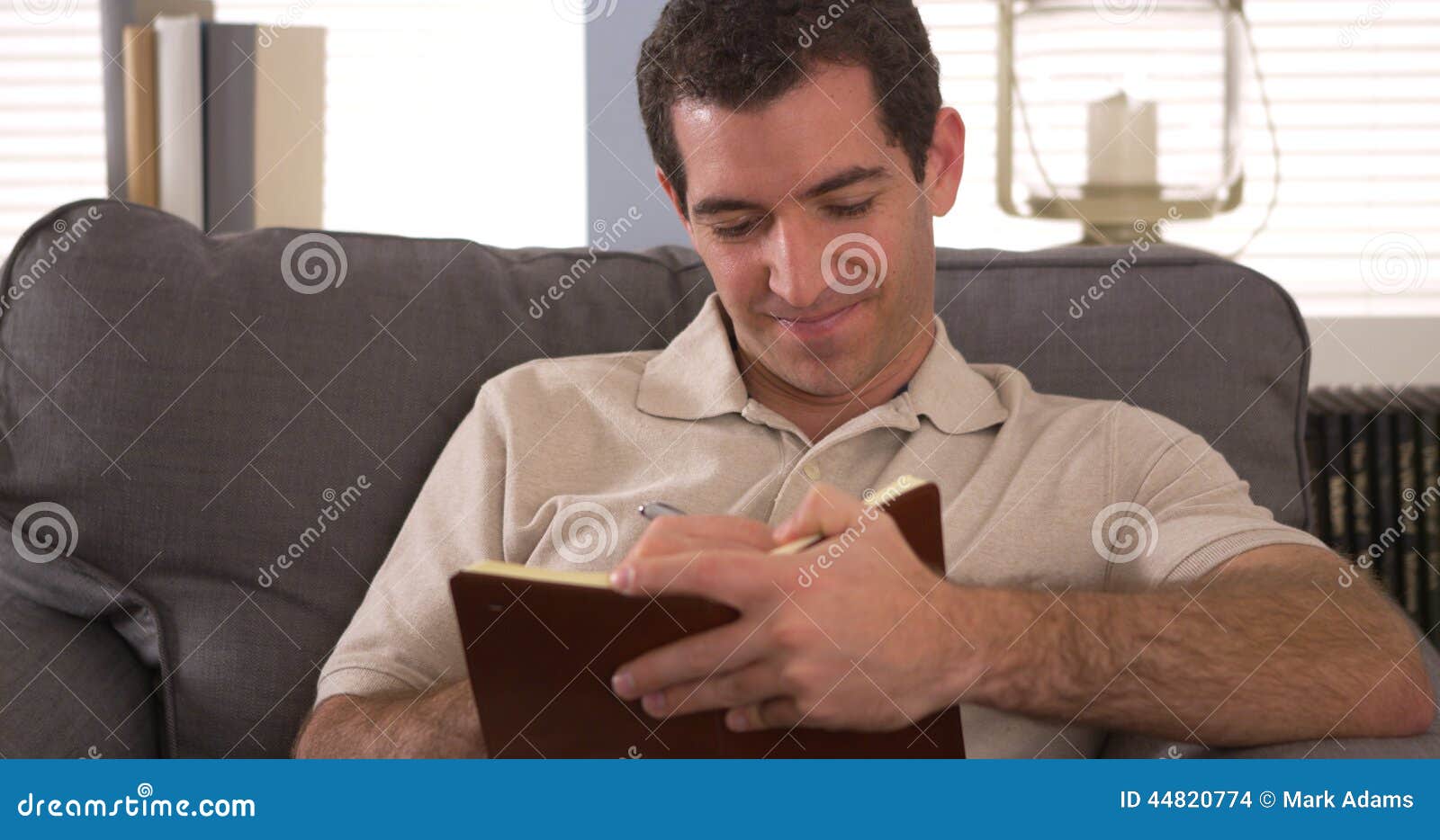 Man Writing Down Thoughts in Journal Stock Photo - Image of caucasian ...