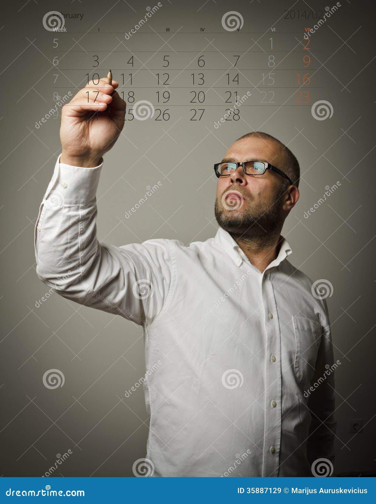 Man is writing. February. stock image. Image of period - 35887129