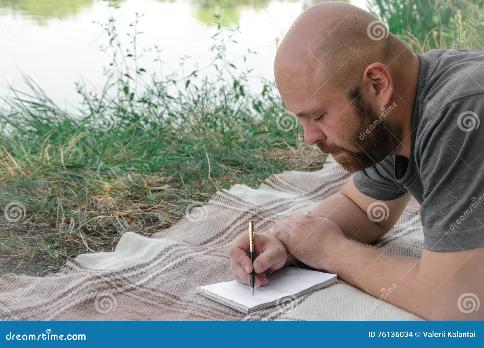 Man Writing in His Notebook in Forest. Stock Photo - Image of work ...