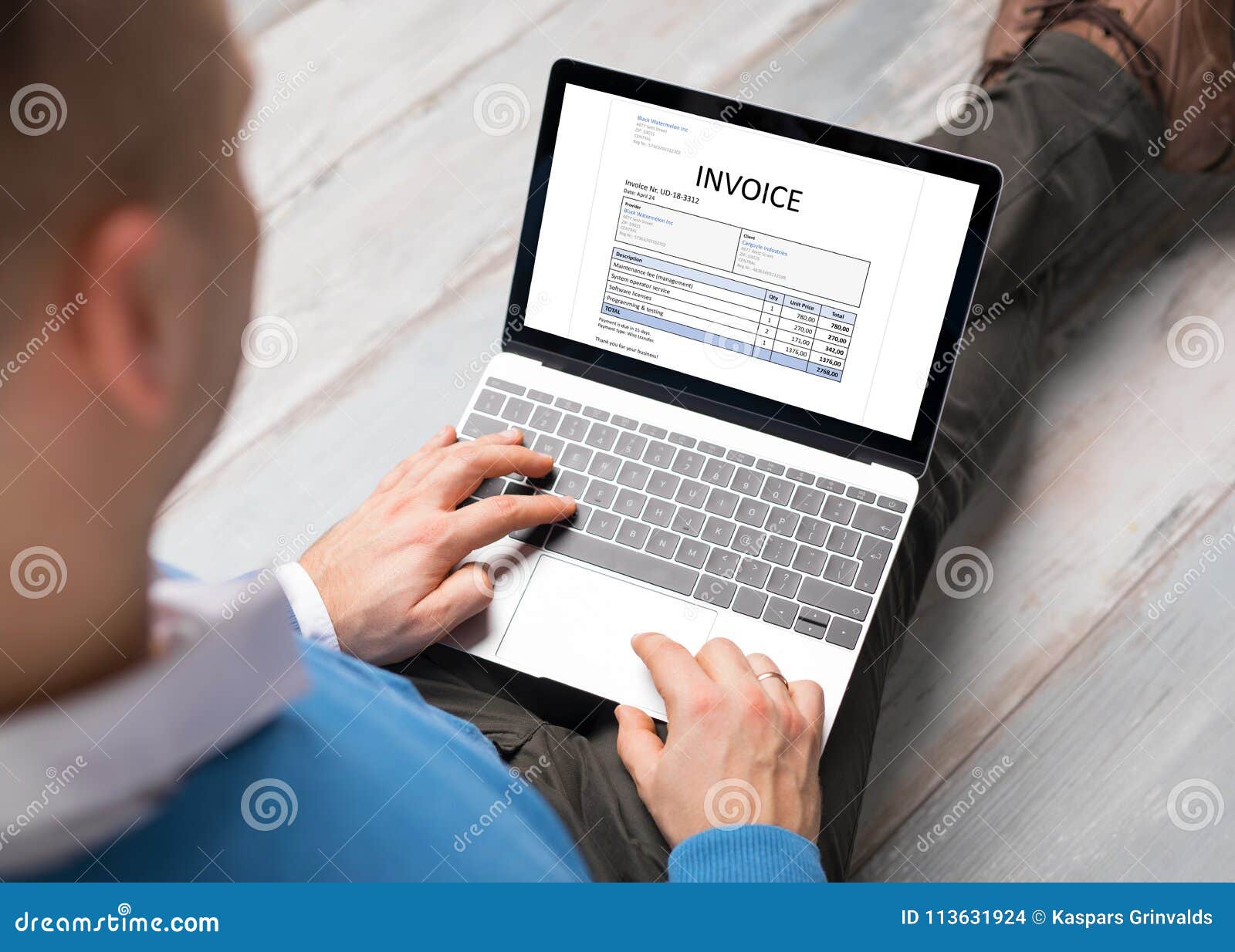 Man Writing Invoice Document on Laptop Computer Stock Photo - Image of ...