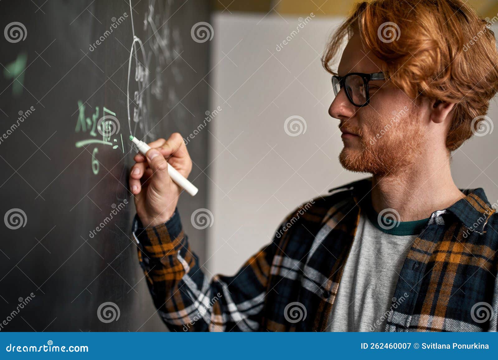 Man Writing Math Formula on Blackboard in Audience Stock Image - Image ...