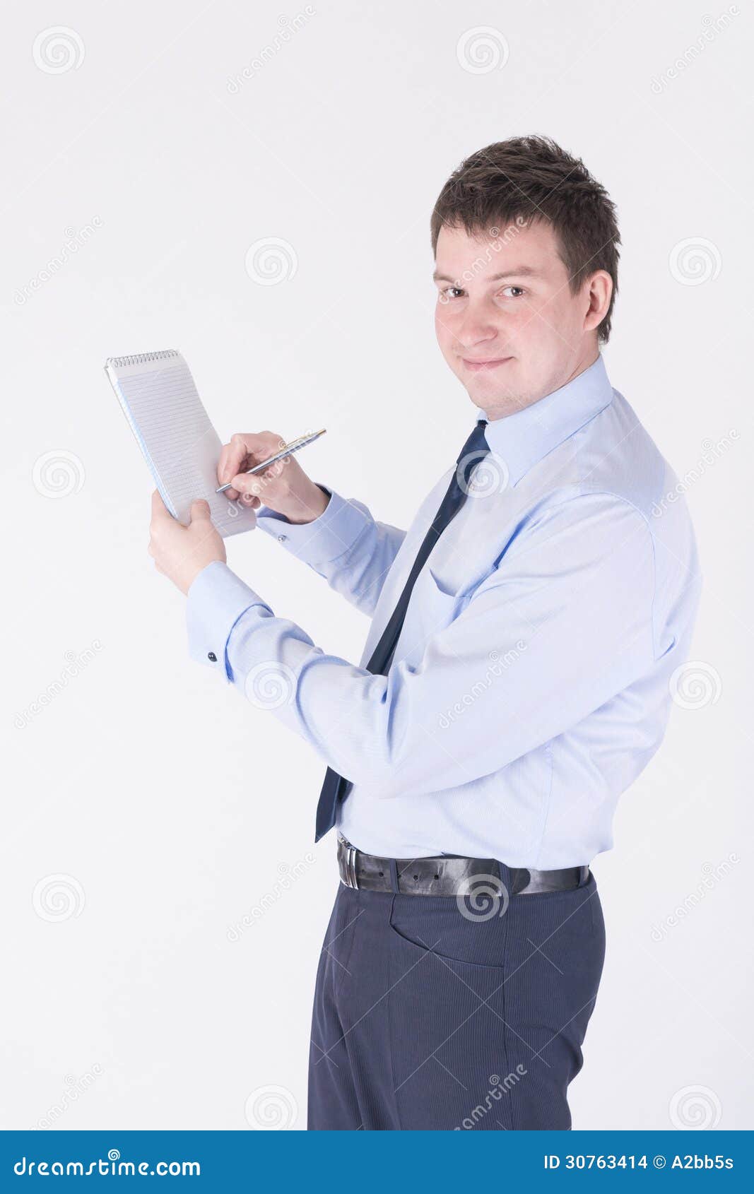 Man writing in a notebook stock photo. Image of male - 30763414