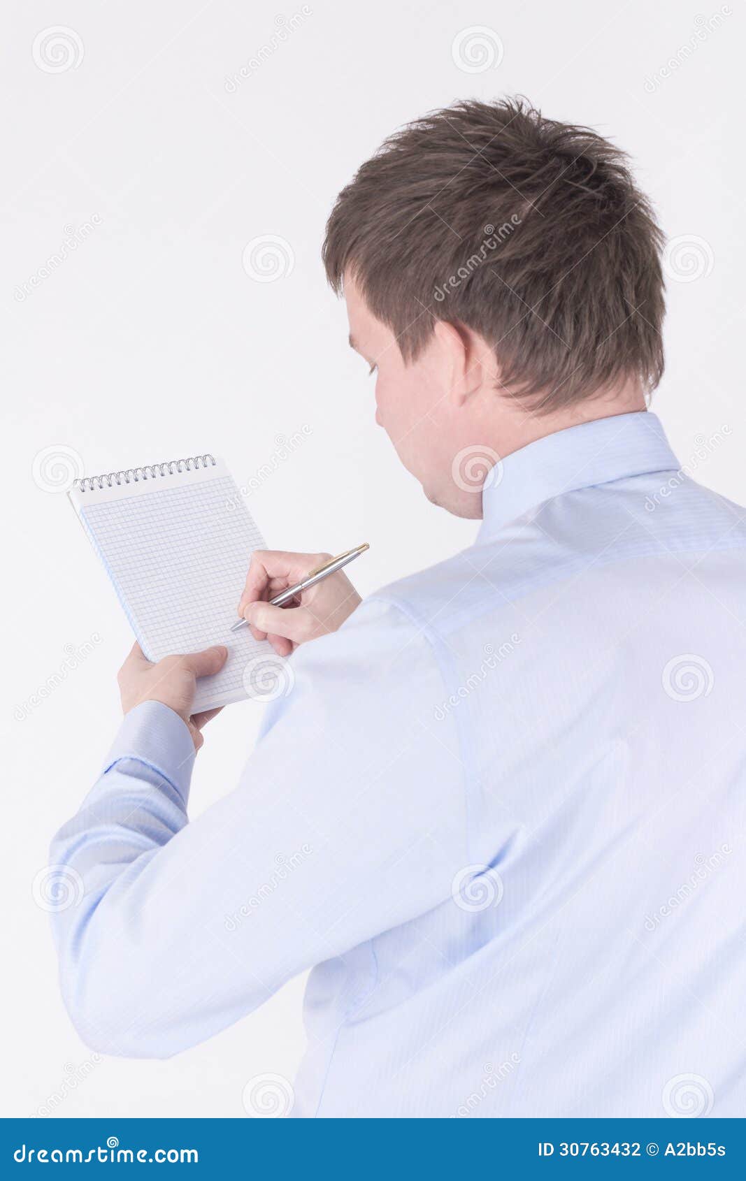 Man writing in a notebook stock photo. Image of person - 30763432