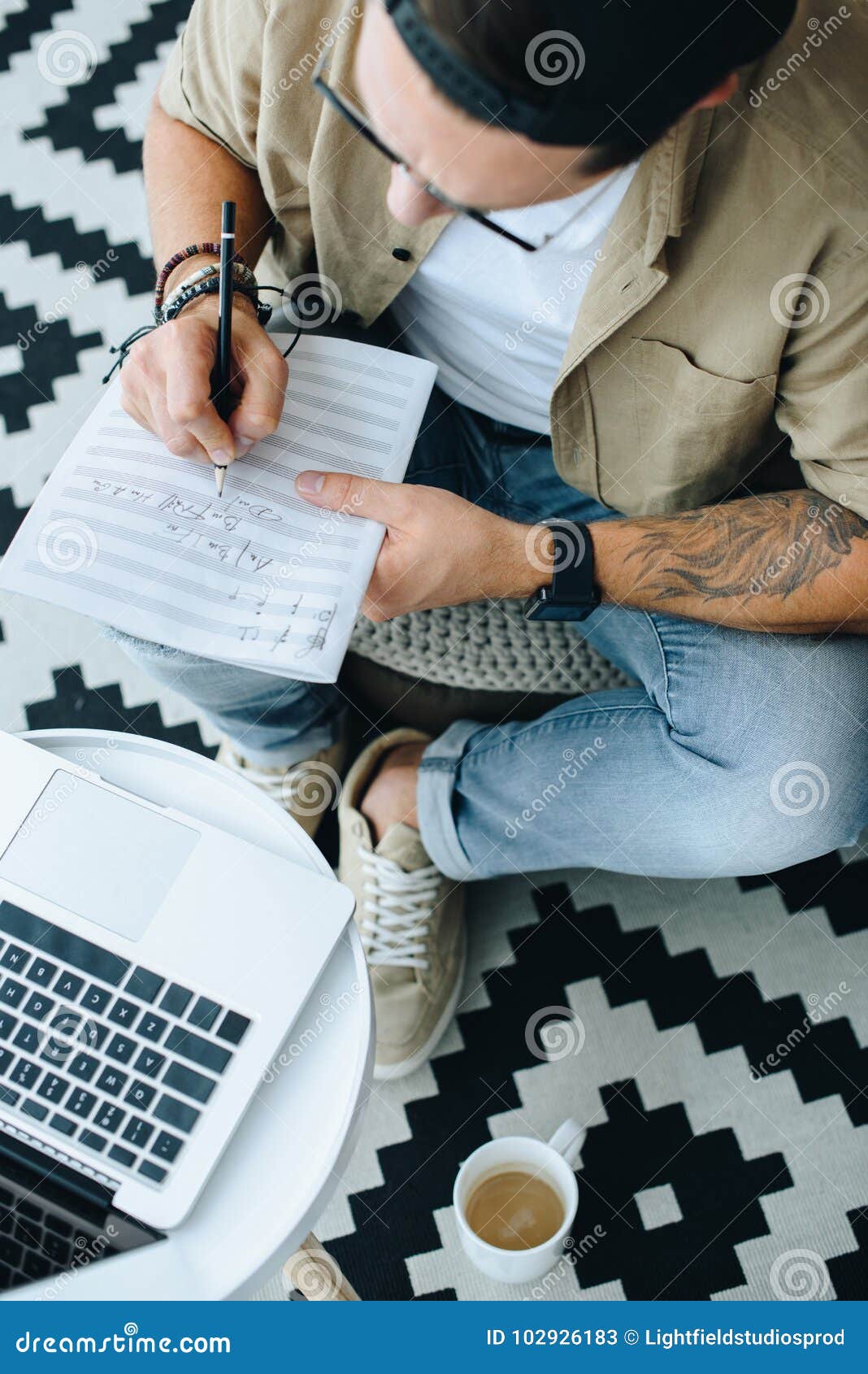 Man Writing Notes and Looking at Laptop Stock Image - Image of people ...
