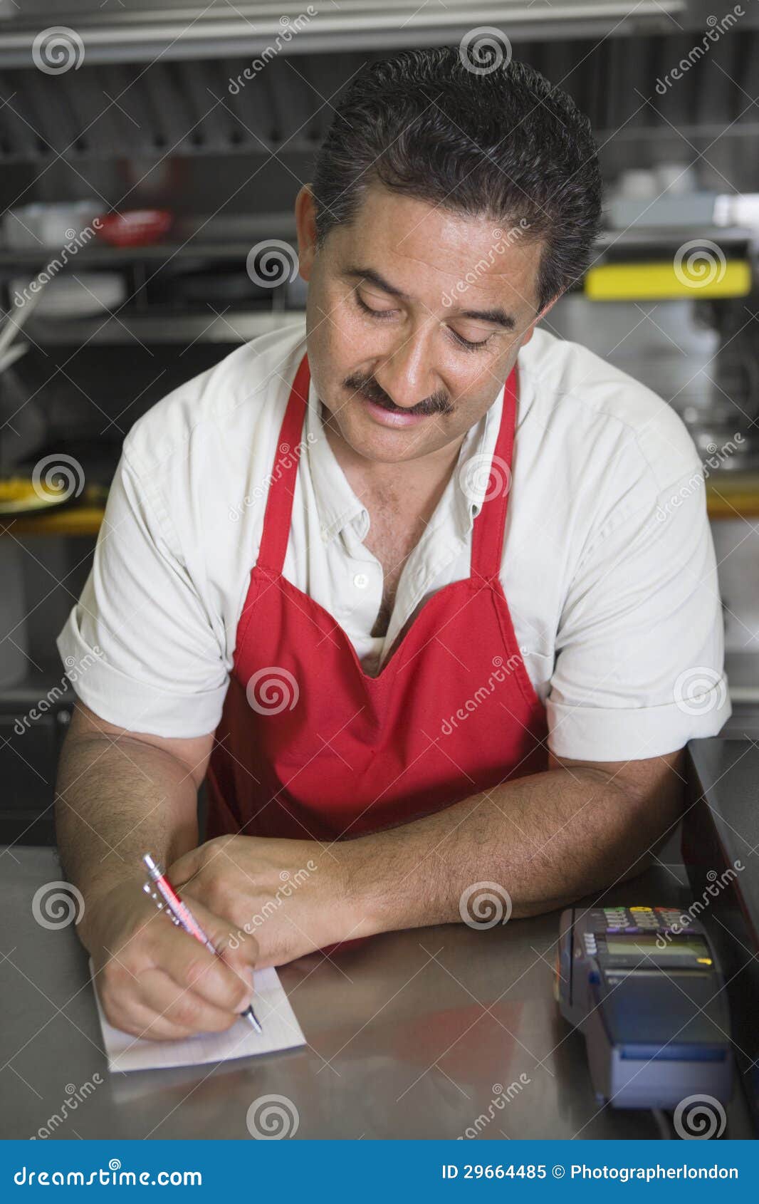 Man Writing Order in Restaurant Stock Image - Image of apron, latin ...