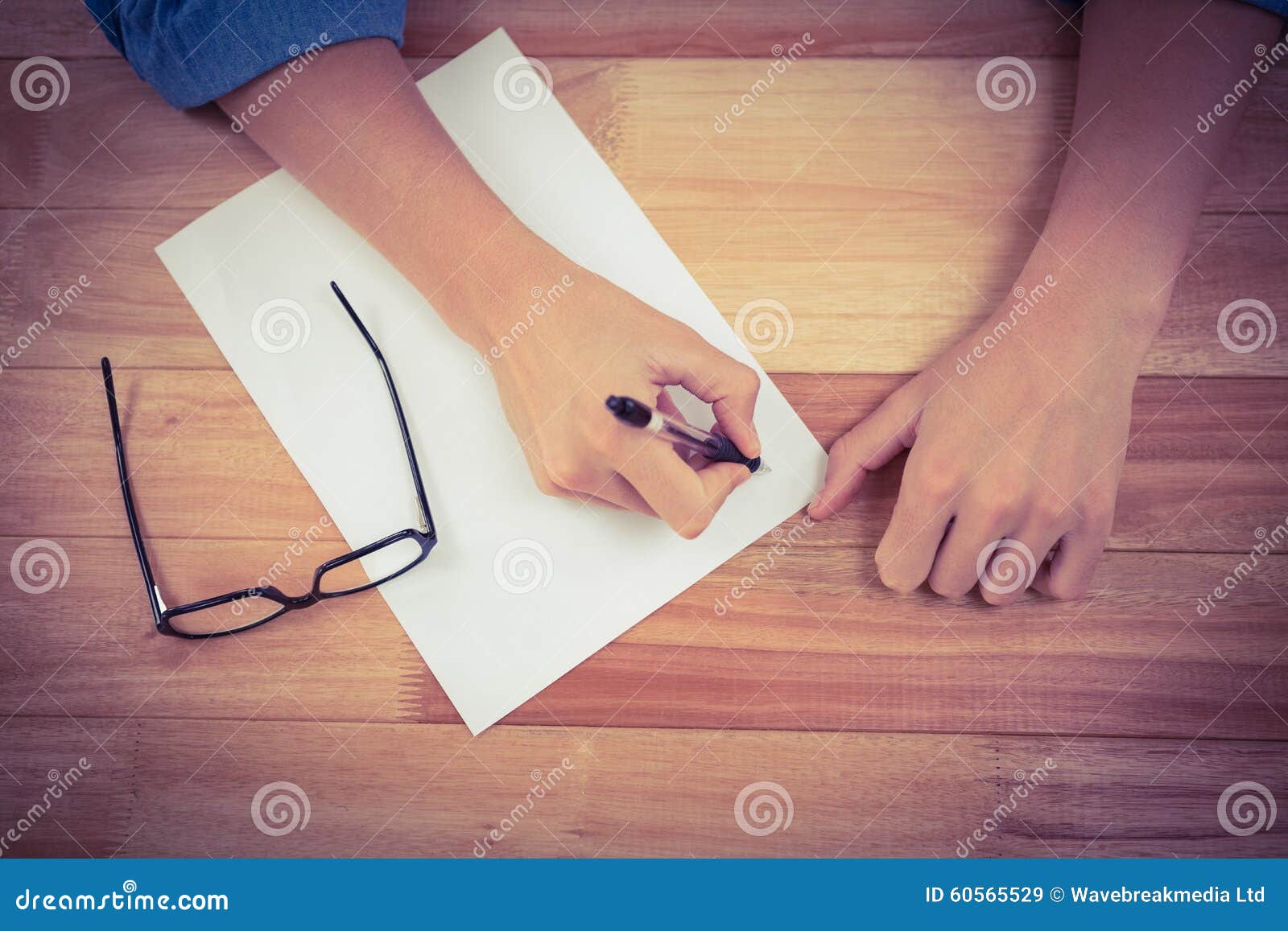 Man Writing in Paper at Desk Stock Image - Image of office, holding ...